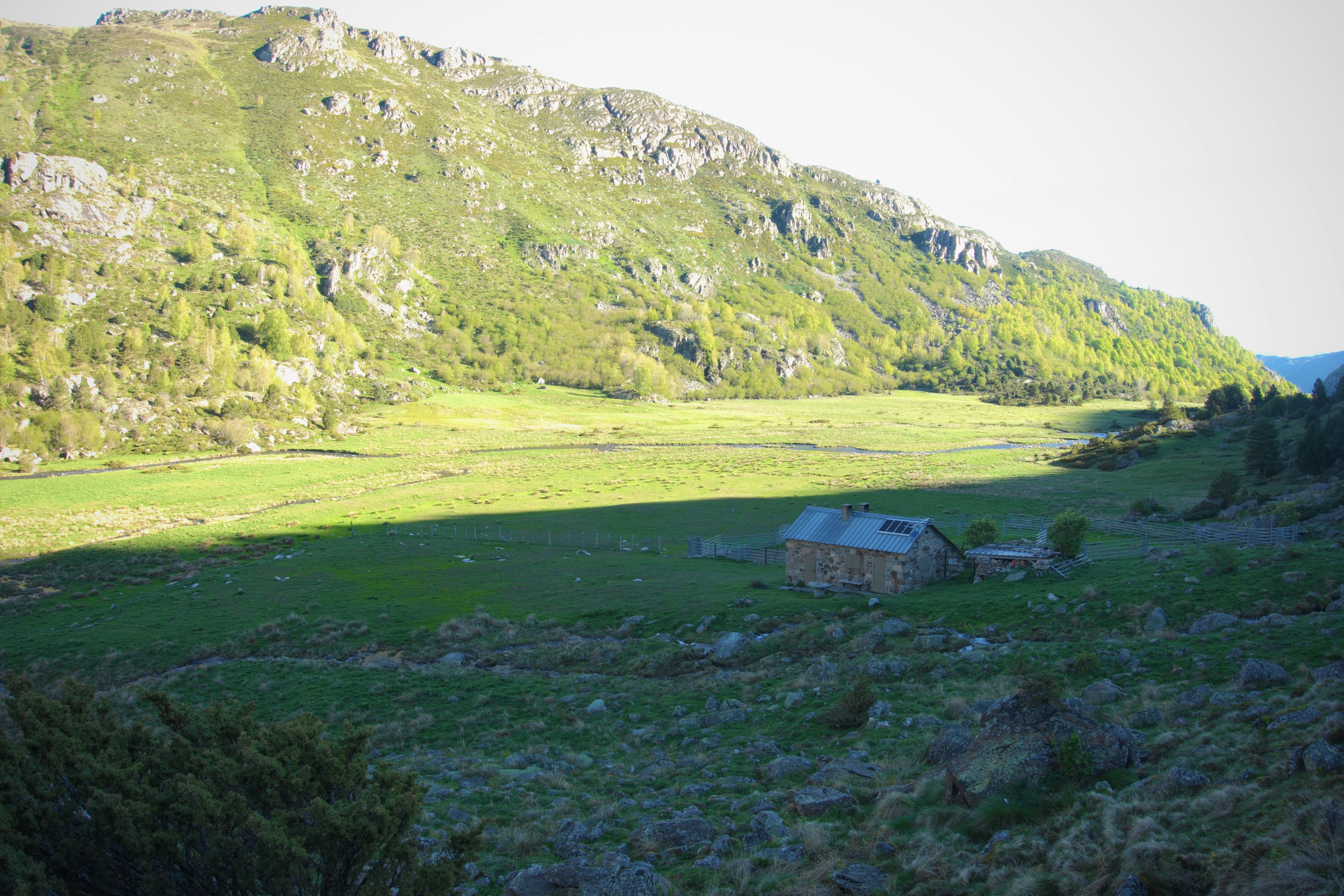 Sunny Meadow Village Nestled at the Foot of a Rugged Ridge