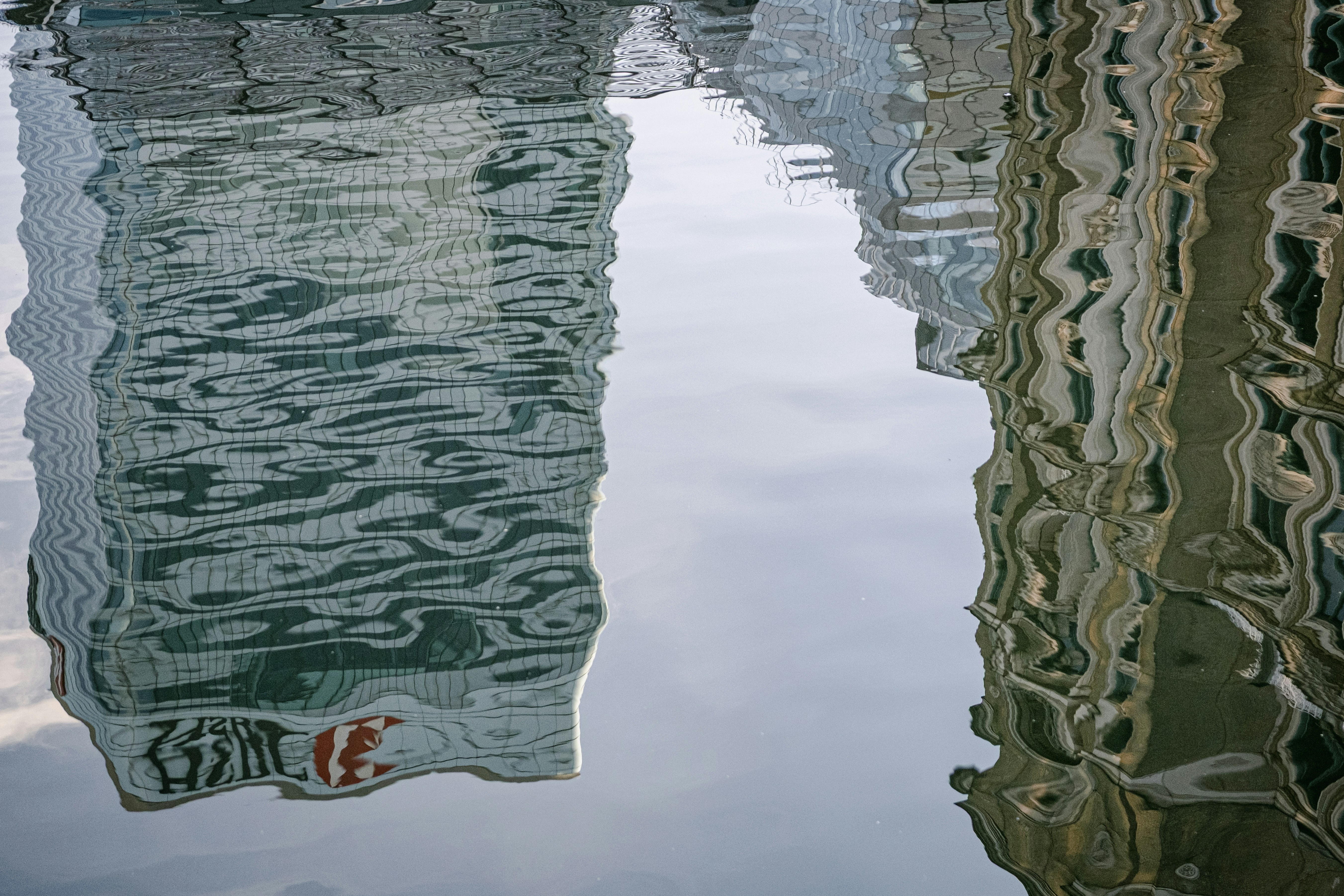 Vertical City Echoes: Reflections of Modern Facades