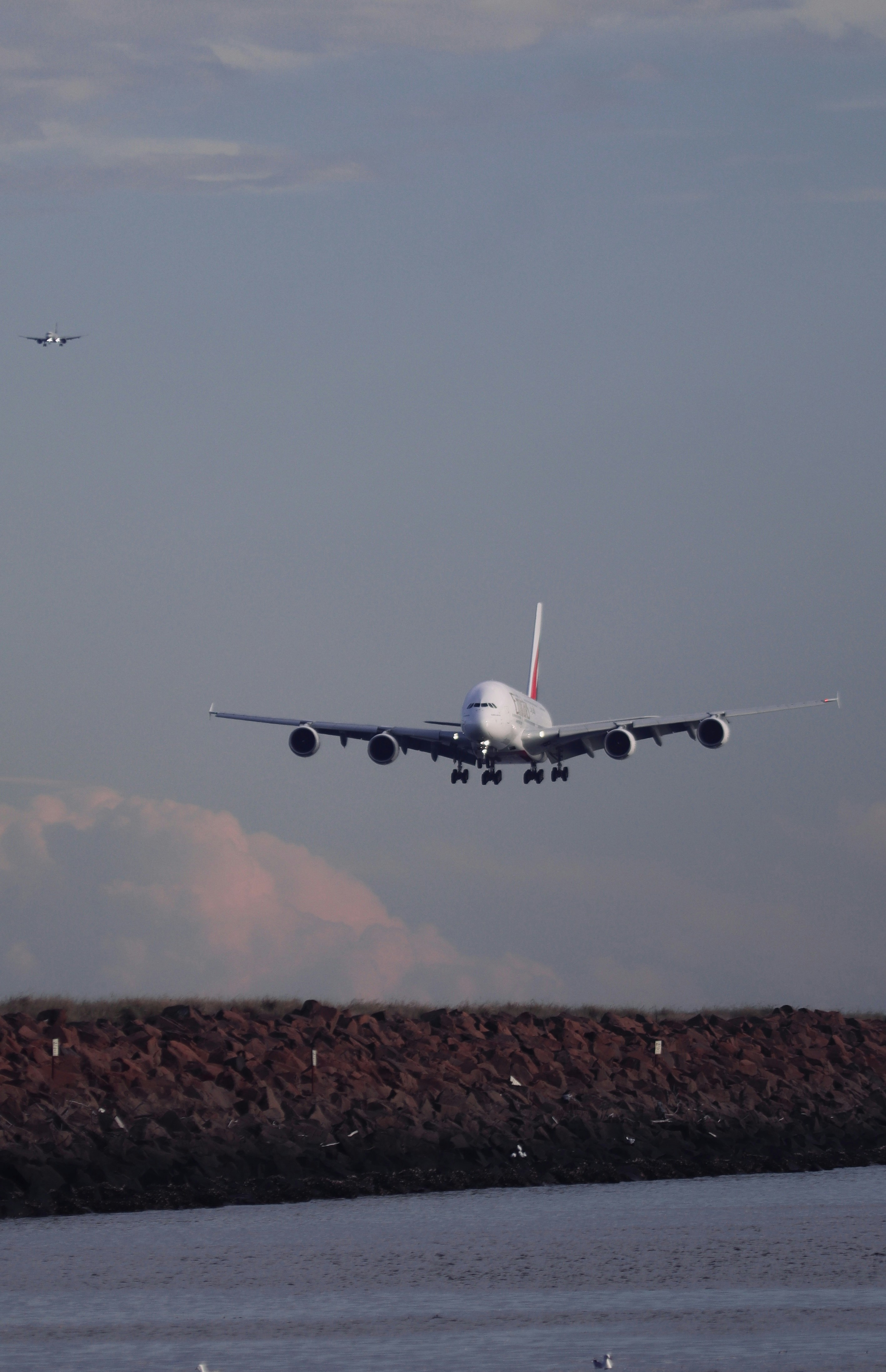 Approach over the Breakwater: A Wide-Body Arcing to Landing