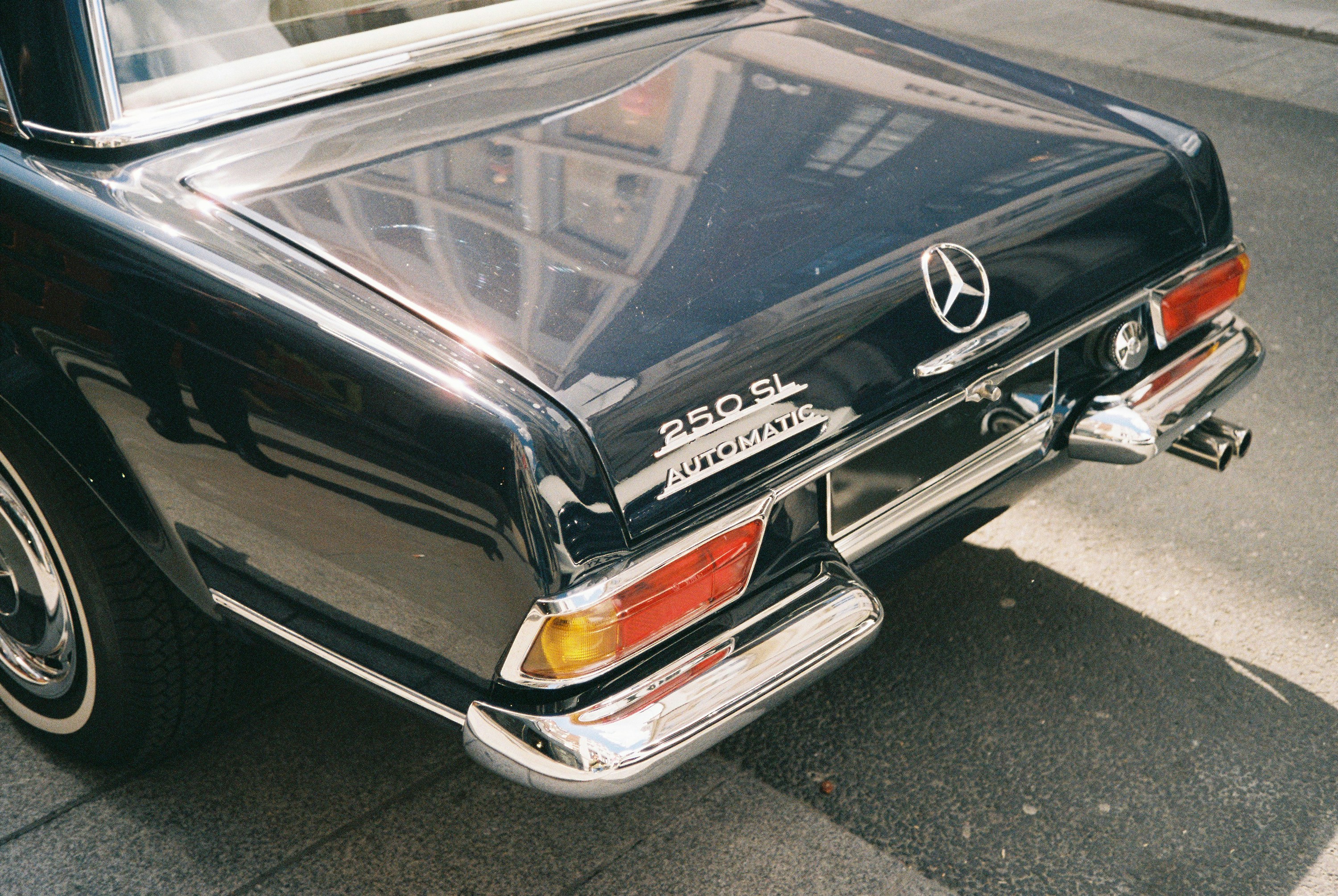 Chrome Heritage: A Mercedes-Benz 250S Legacy Embraced by Streetlight Reflections