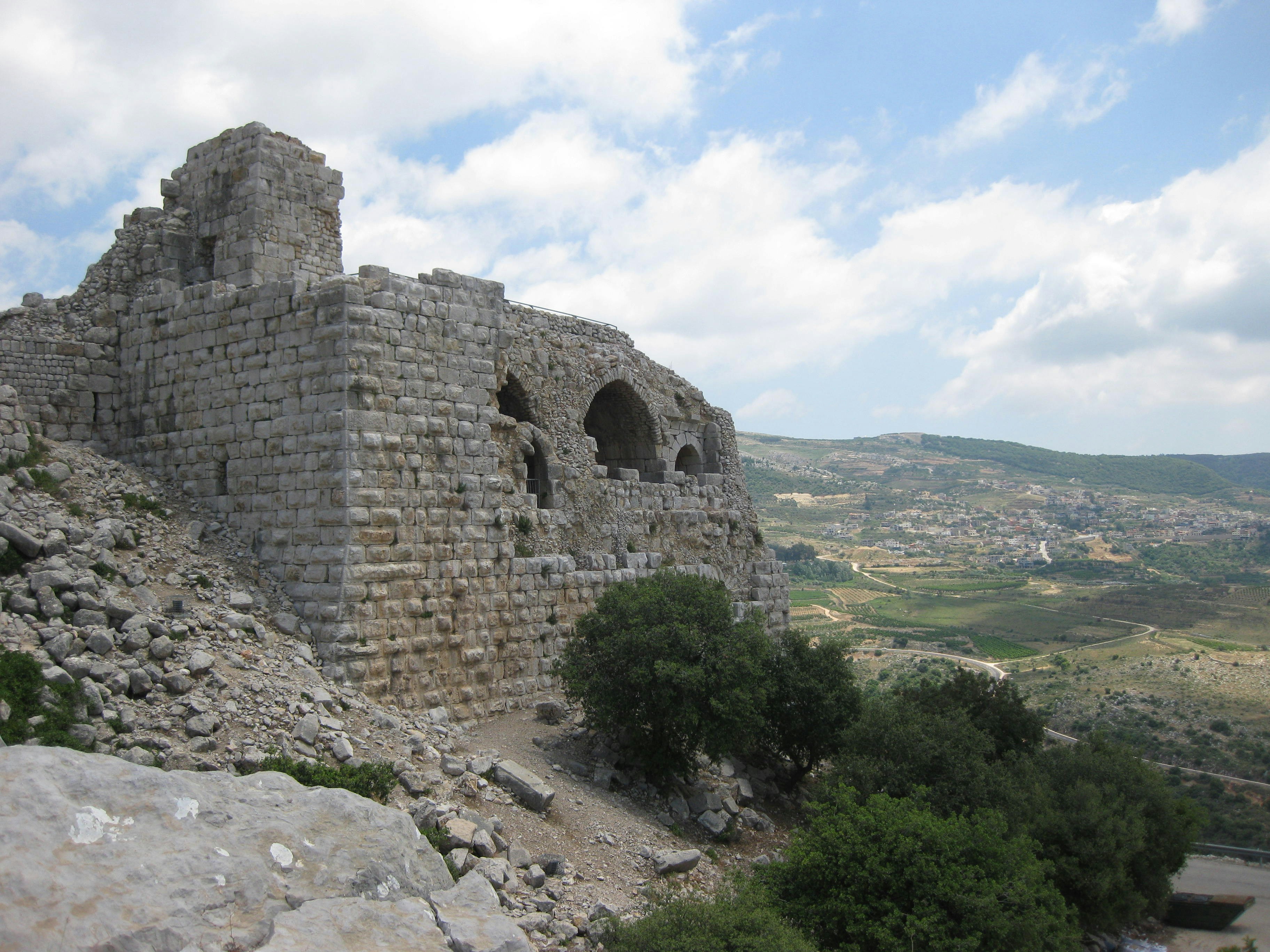 Ruined Fortress Overlook in Rolling Quarry Valleys