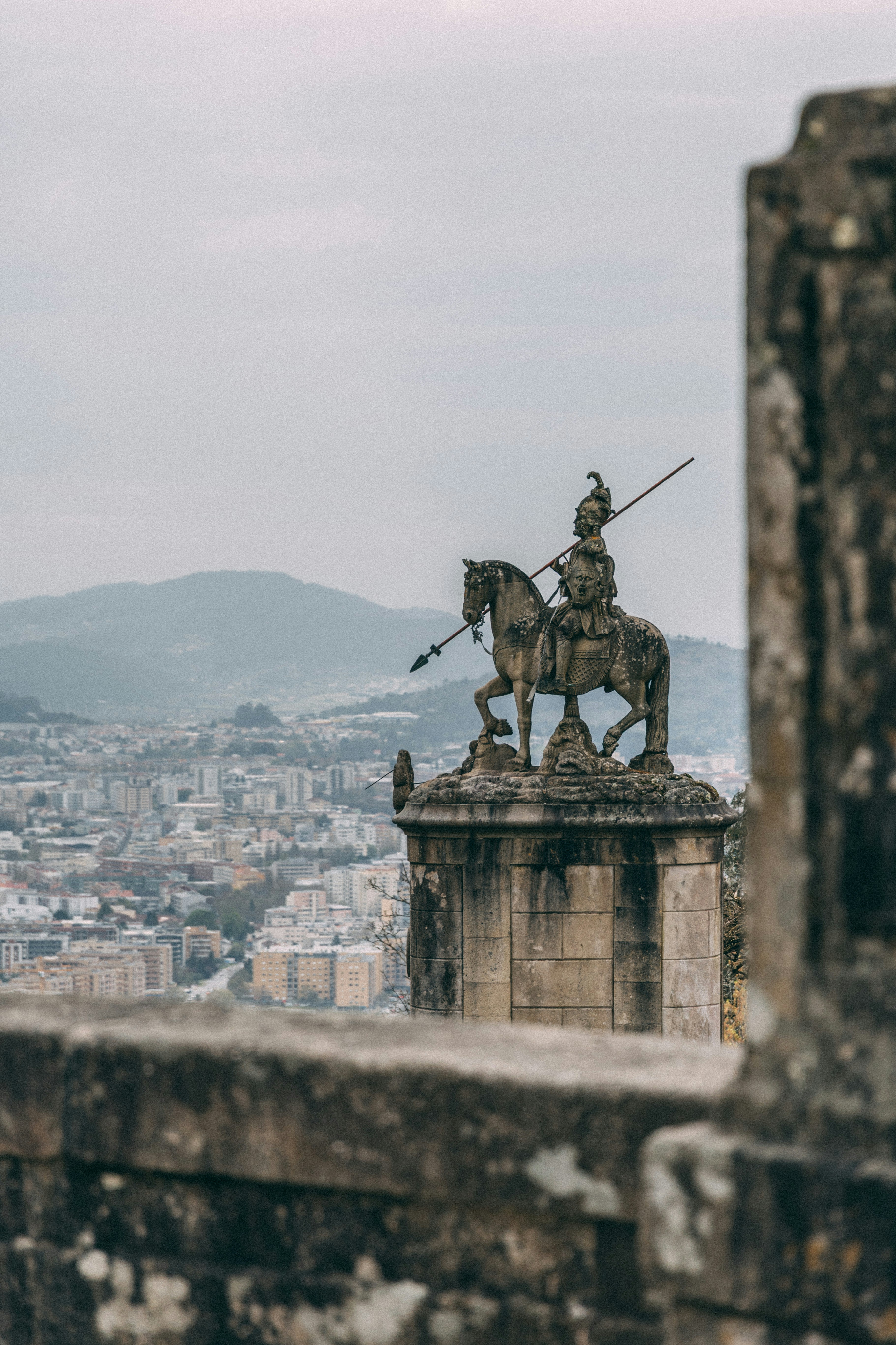 Guard in Stone: A Mounted Sentinel Overlooking the City