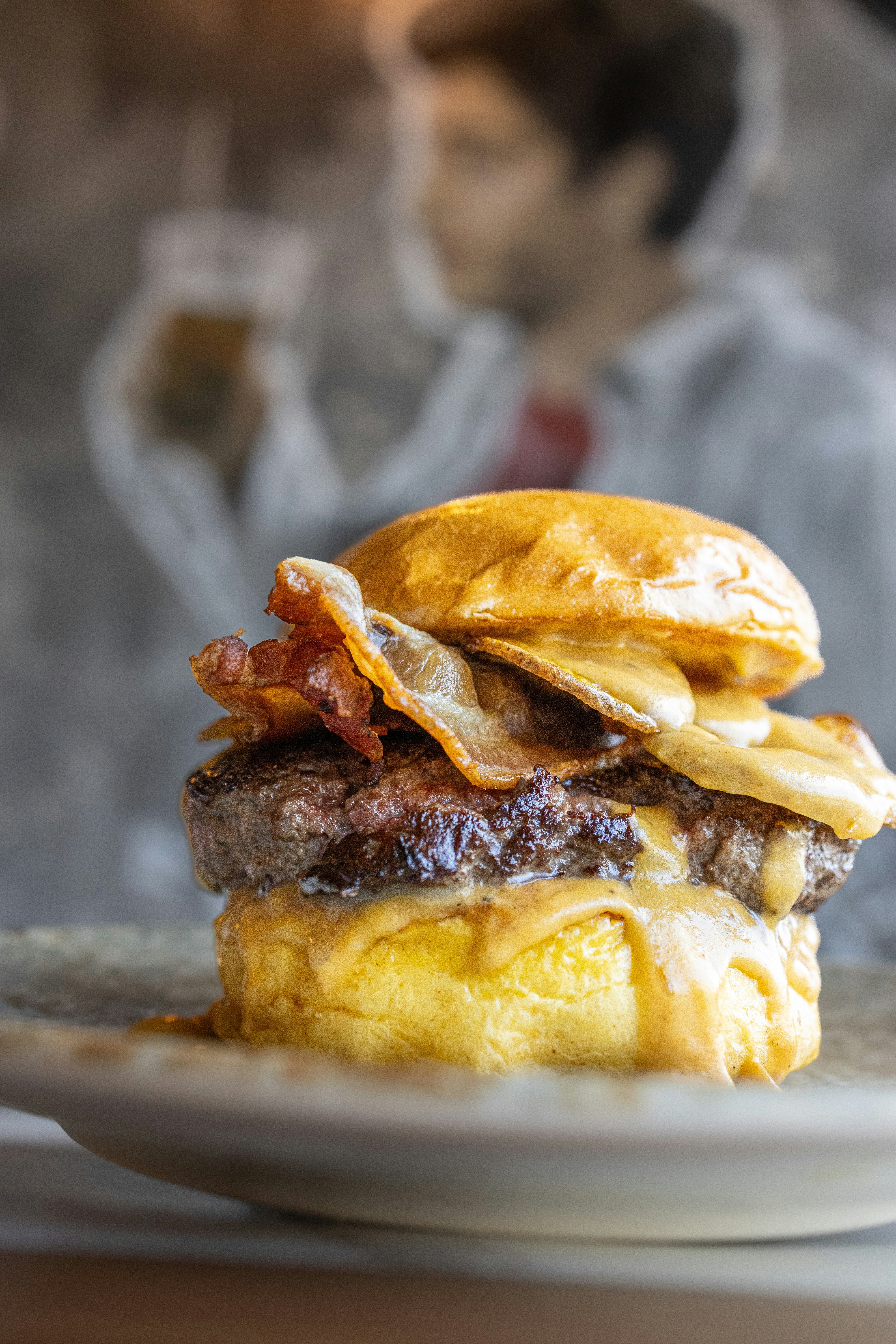 Cheddar Sunrise Stack: A Gourmet Burger Close-Up