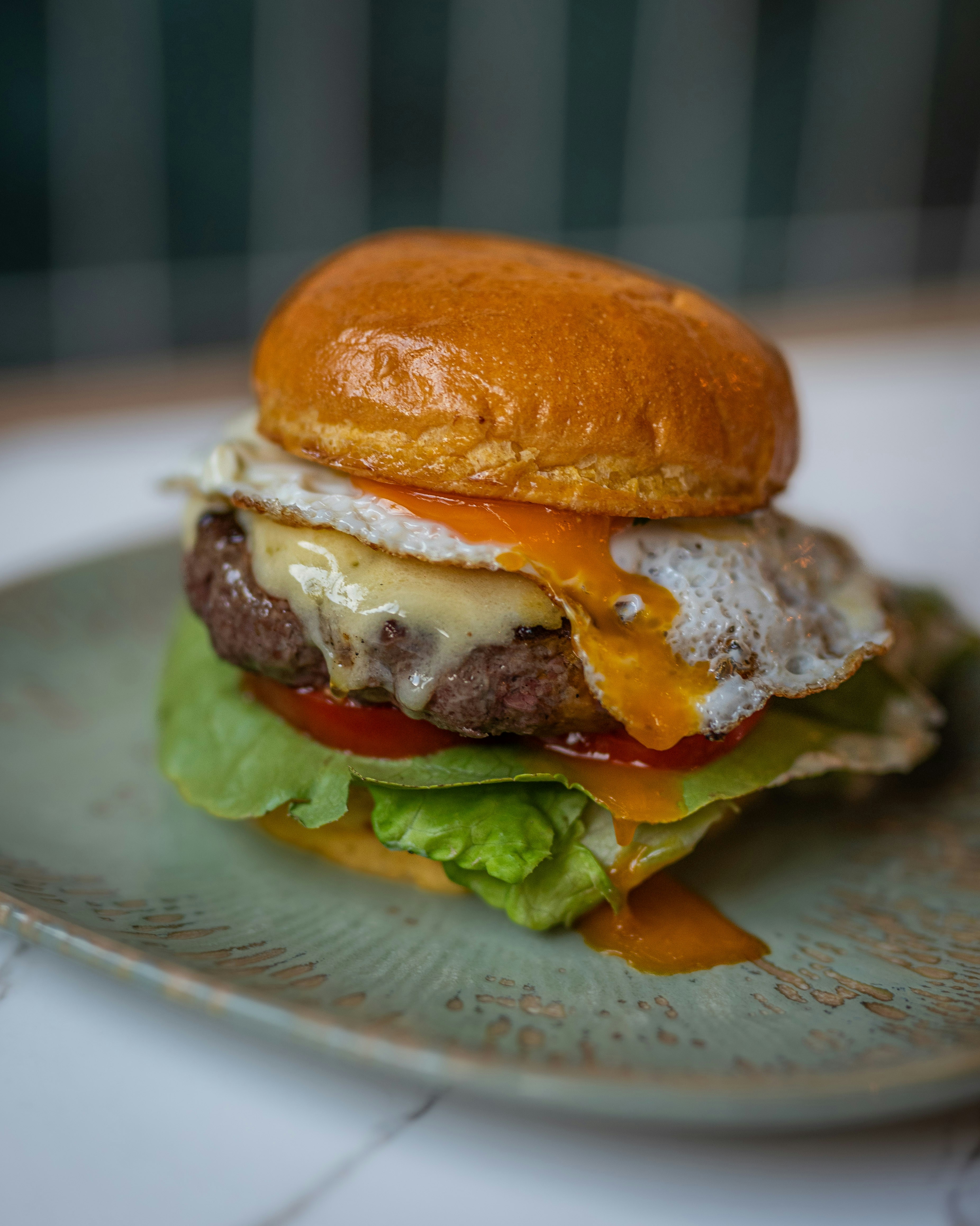 Juicy Stack: A Gourmet Burger Centered on a Golden Bun
