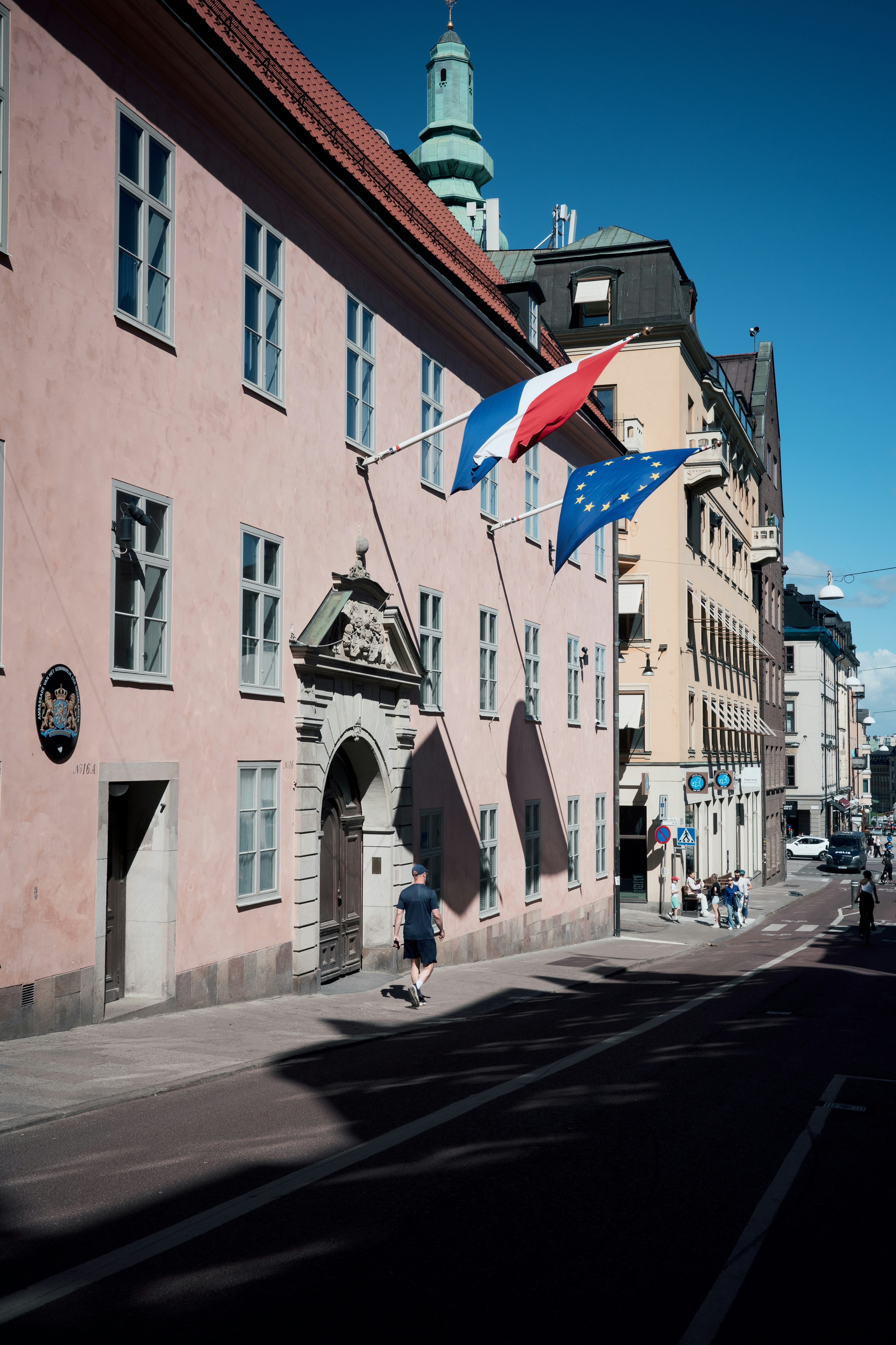 Flags on a Sunlit City Street