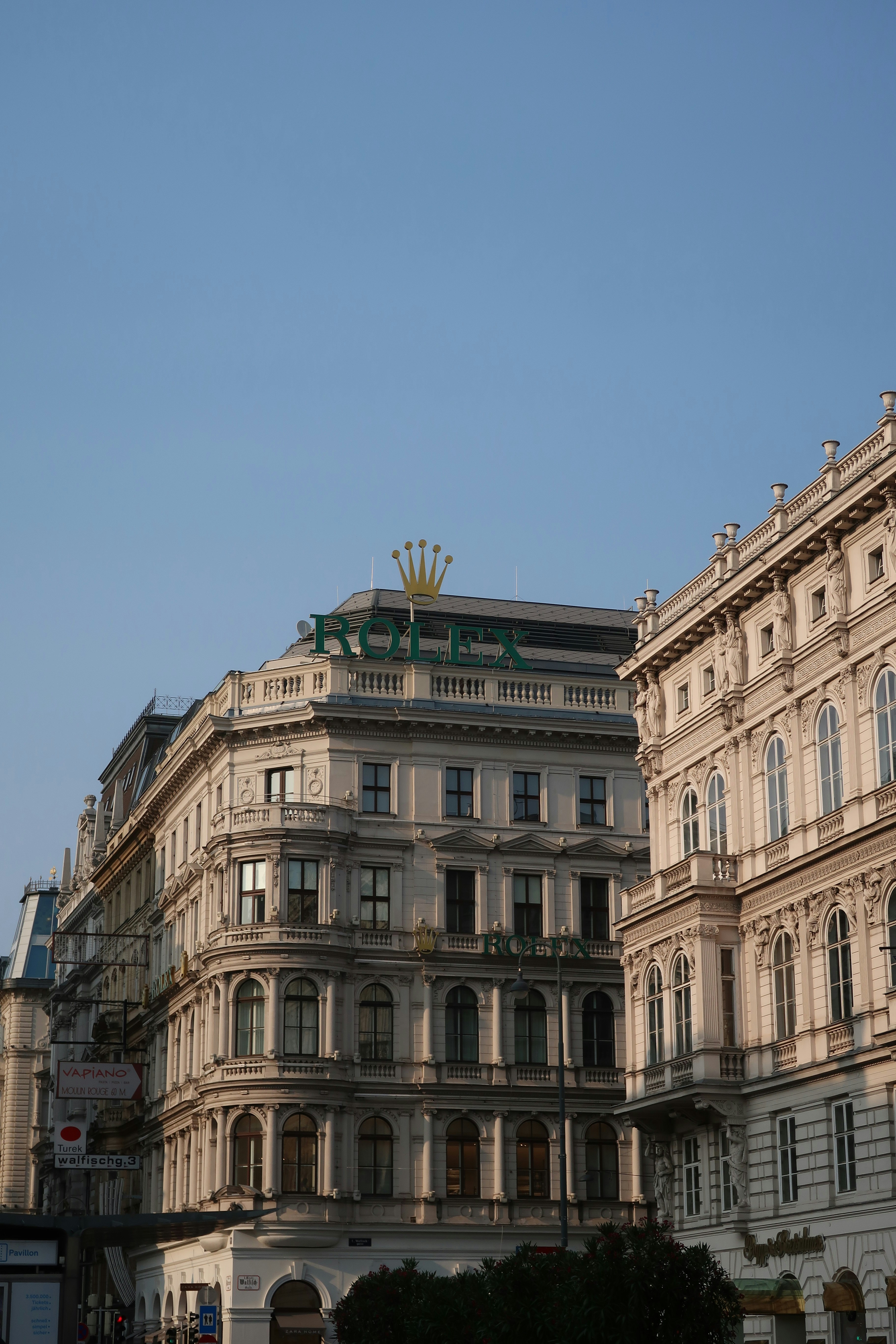 Signage in the Old City: Rolex Crown Above the Cornered Façade