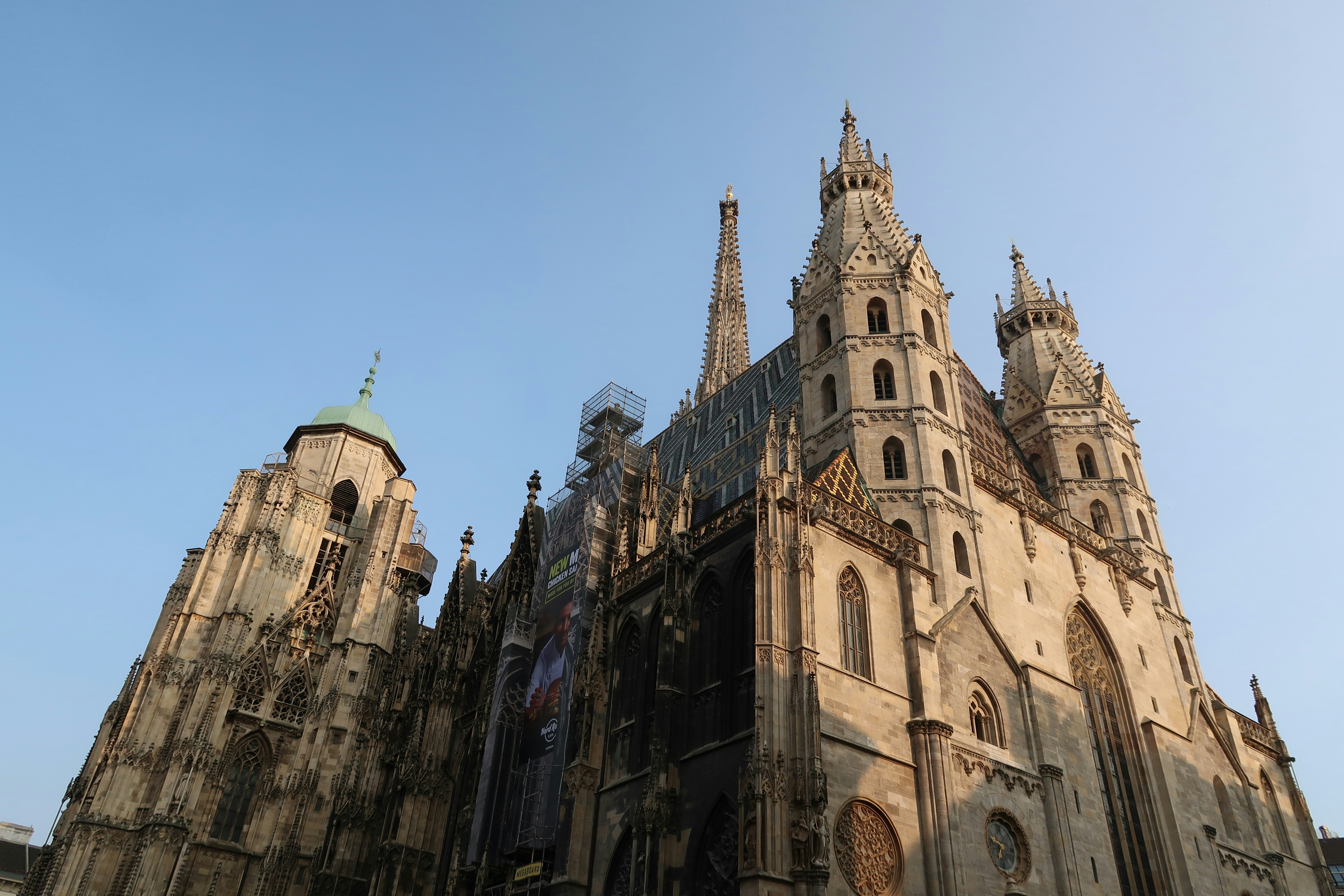 Gothic Majesty: Cathedral Facade Reaching Toward a Clear Sky