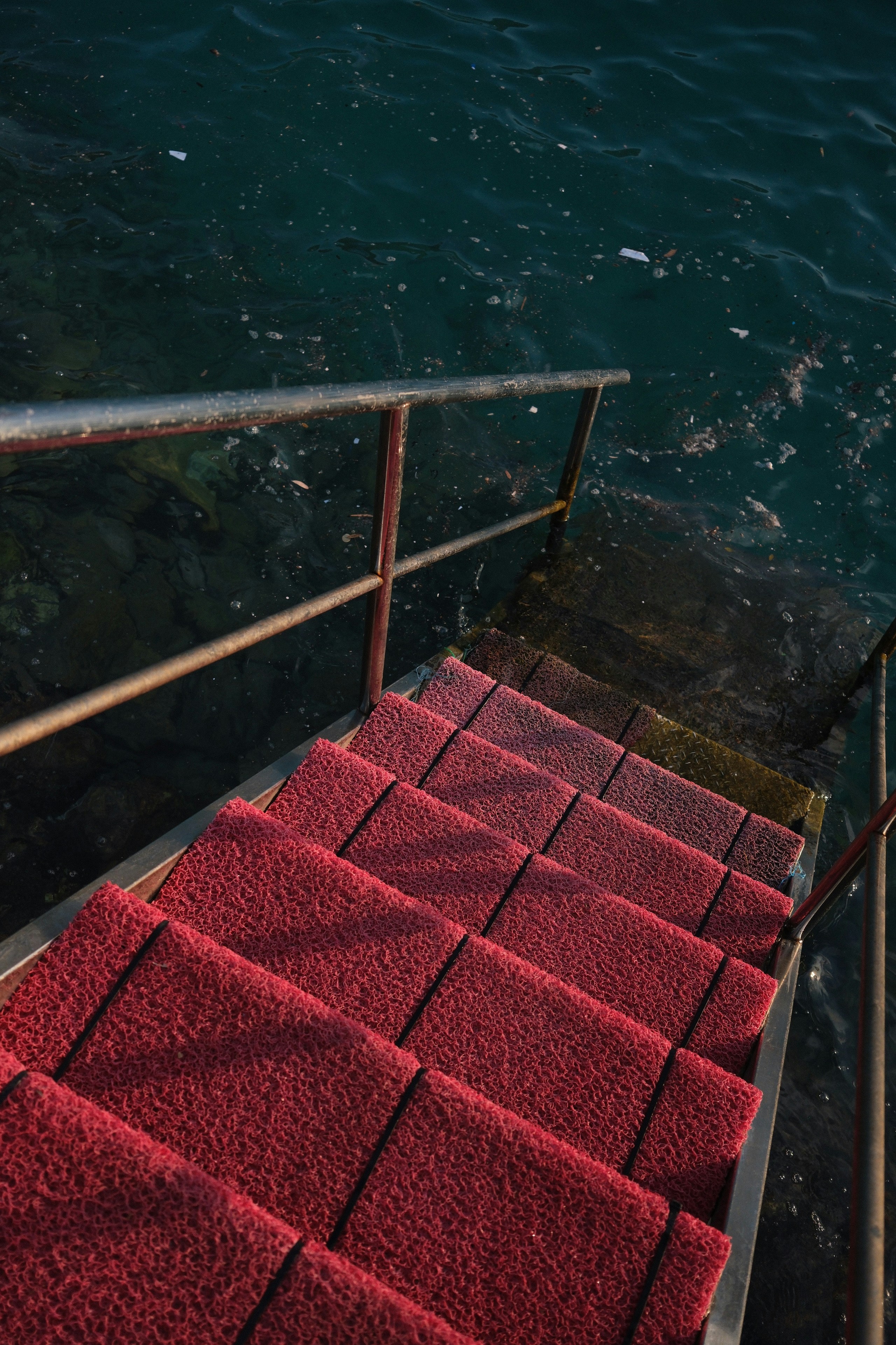 Crimson Steps Anchored by Stormy Waters