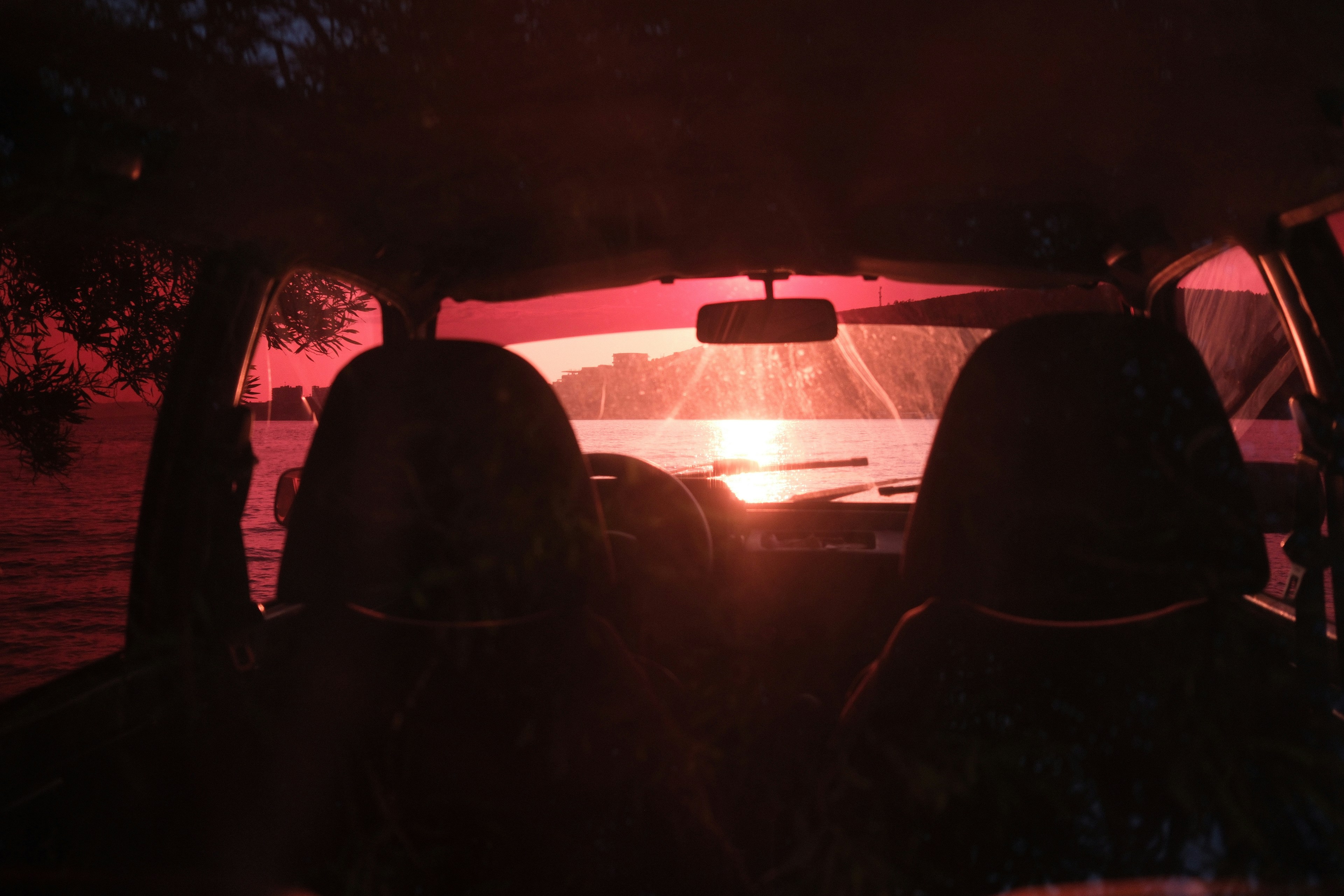 Sunset Drive: Red Glass and Backseat Echoes
