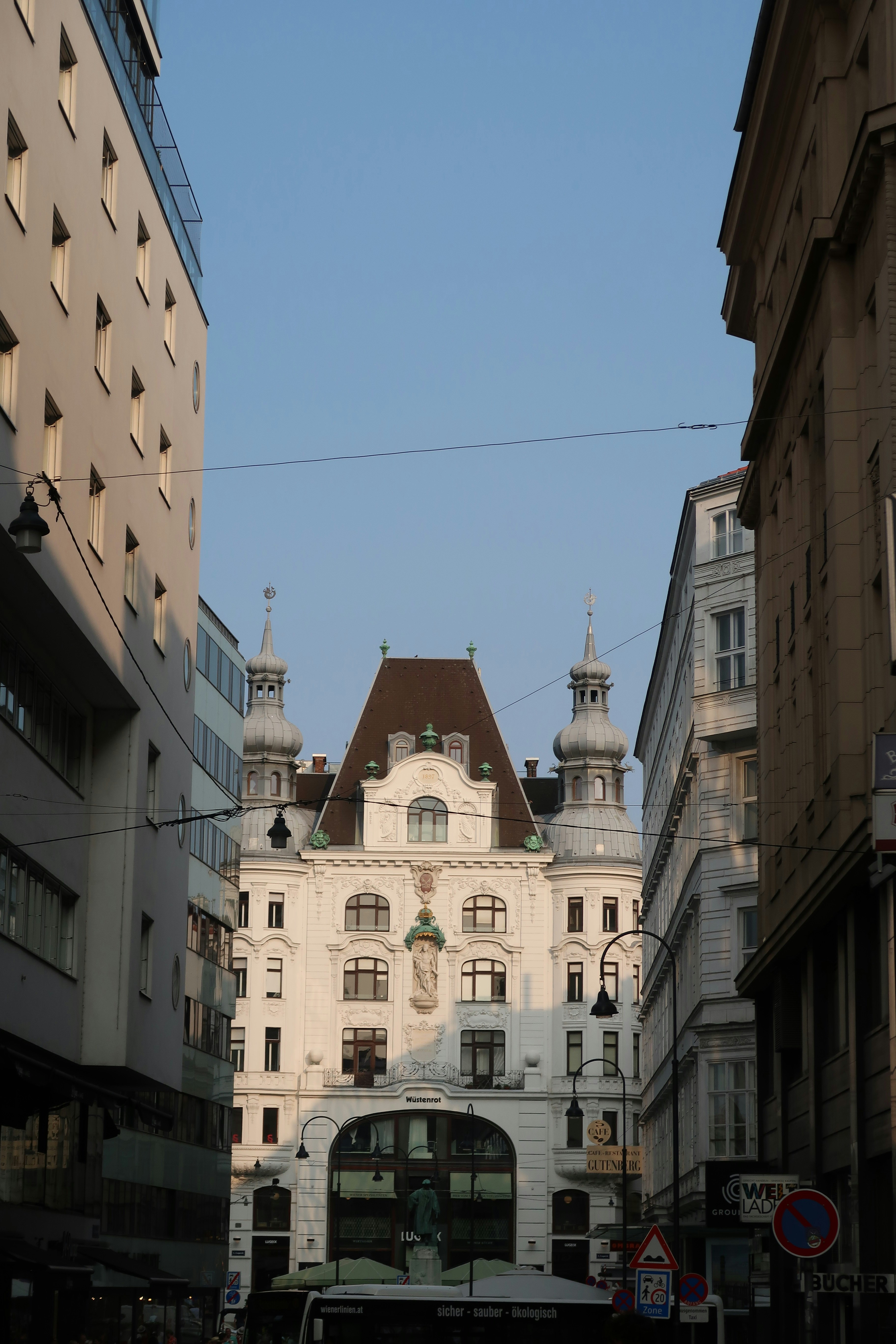 Gothic Facade Serenade: A City’s Quiet Frontage Framed by Street Life