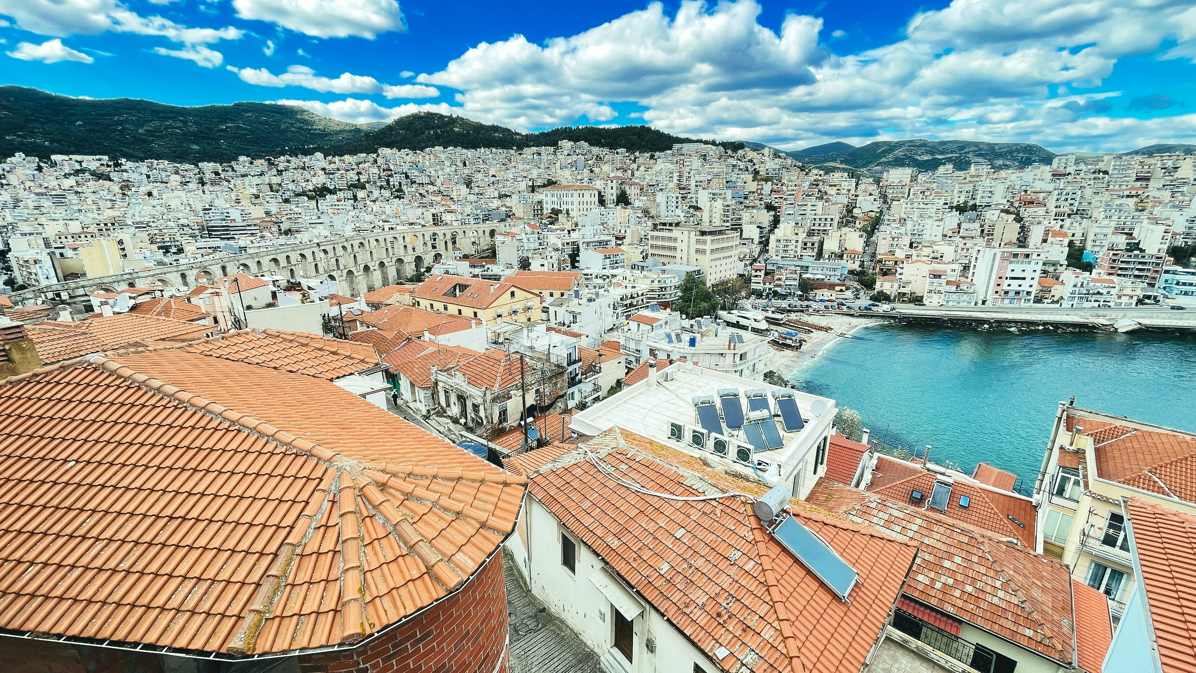 Terracotta Rooftops Over a Sea Town