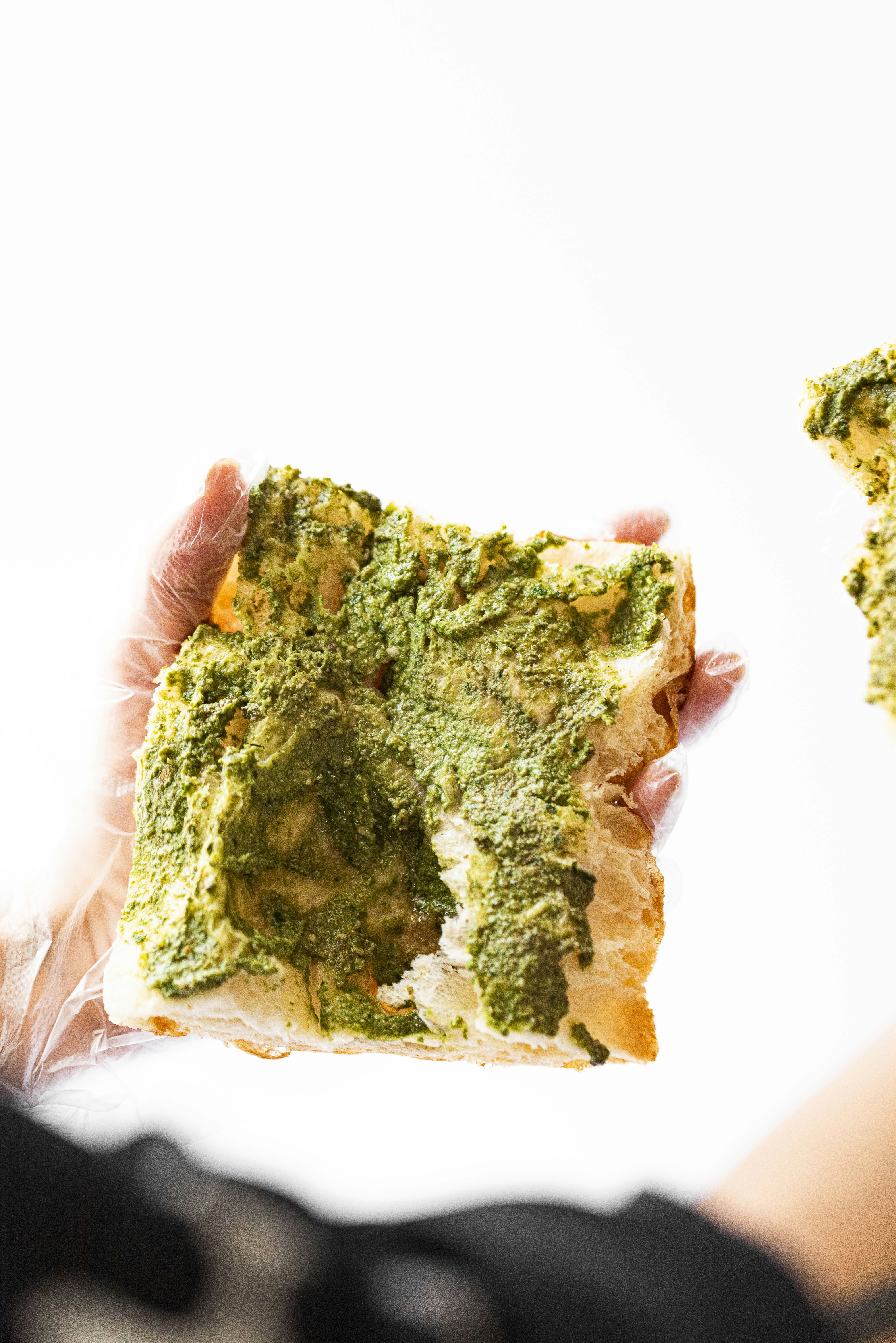 Herb-Top Toast: A Glimpse of Green Pastes on Crust