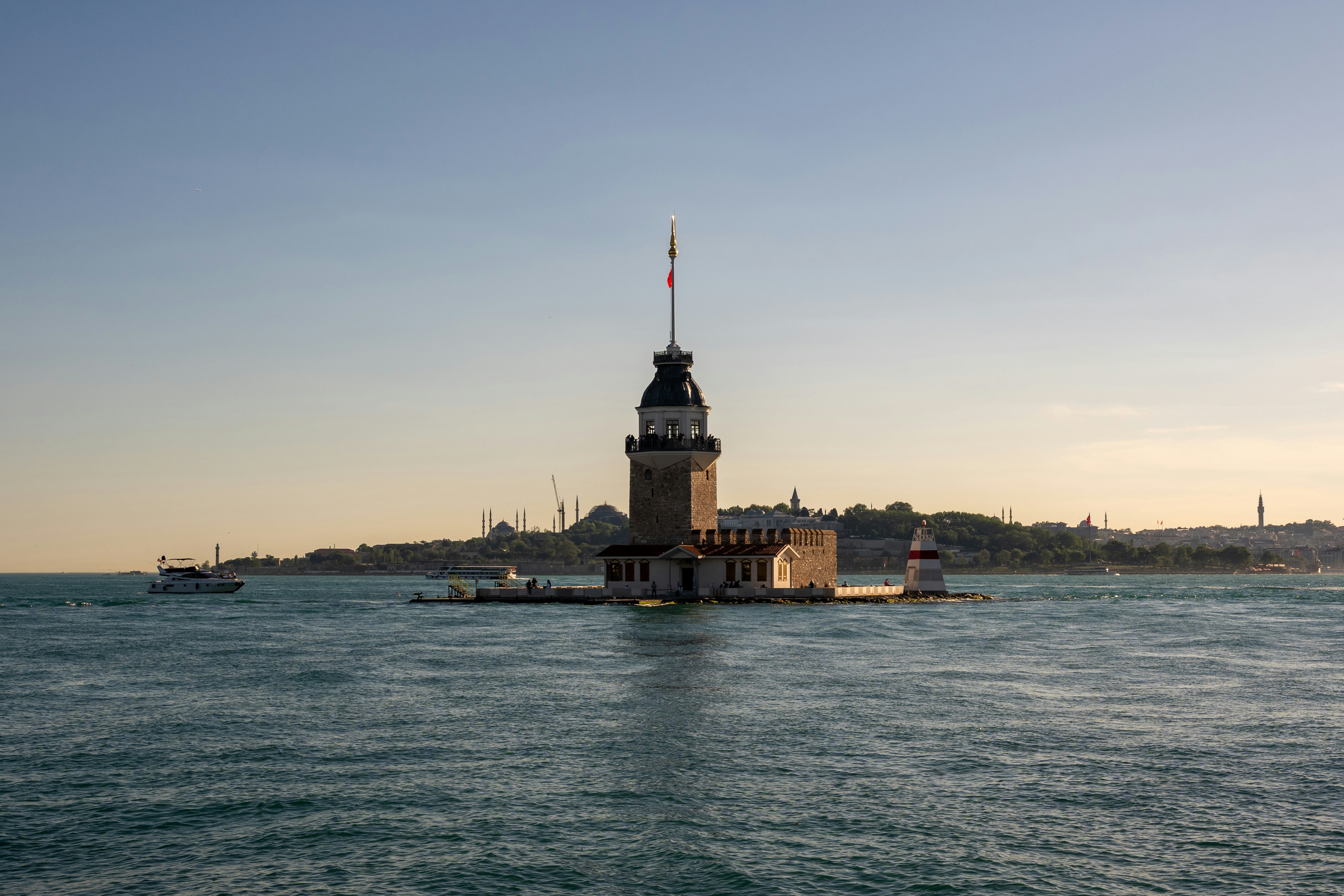 Single-tower beacon rising from the calm seas