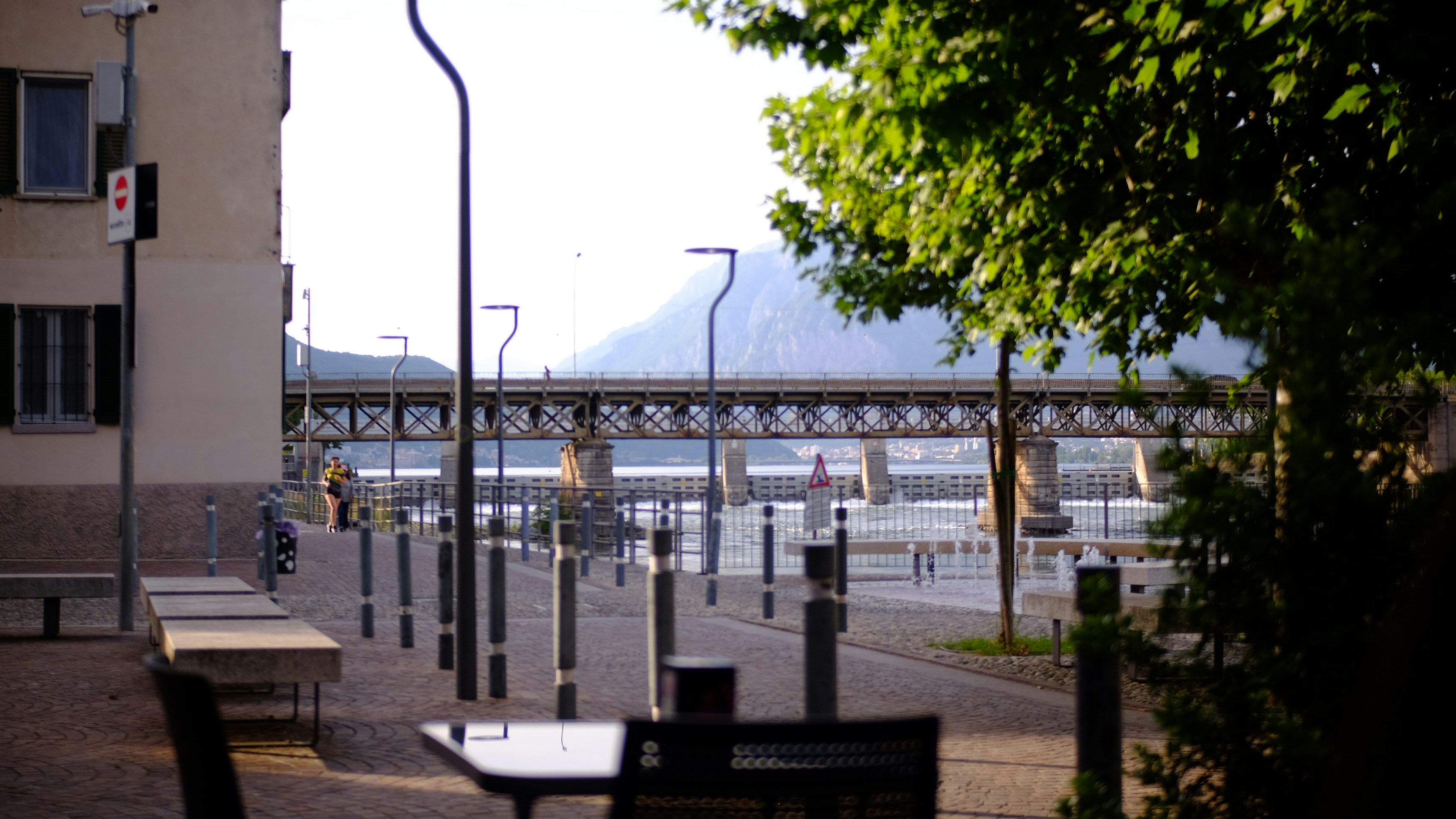 Harbor Promenade Beneath a Shaded Canopy