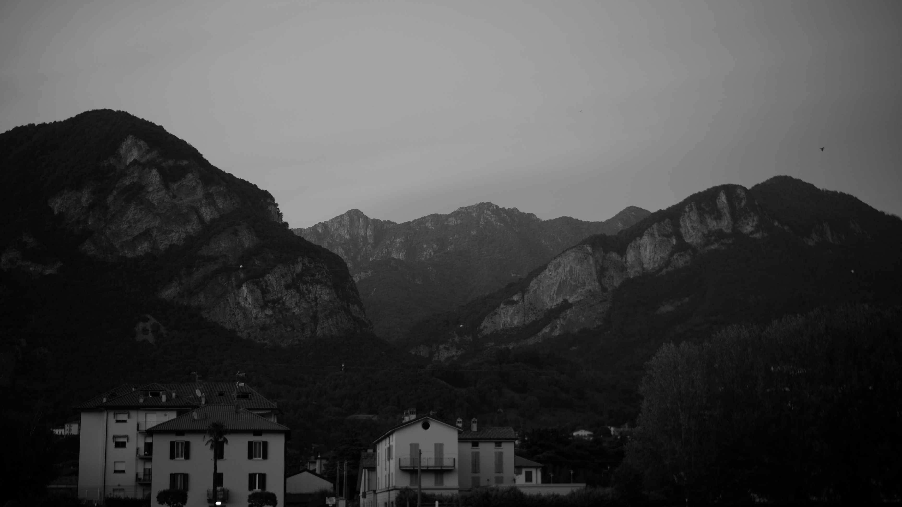 Silent Valley: Mountains Loom Over a Quiet Village