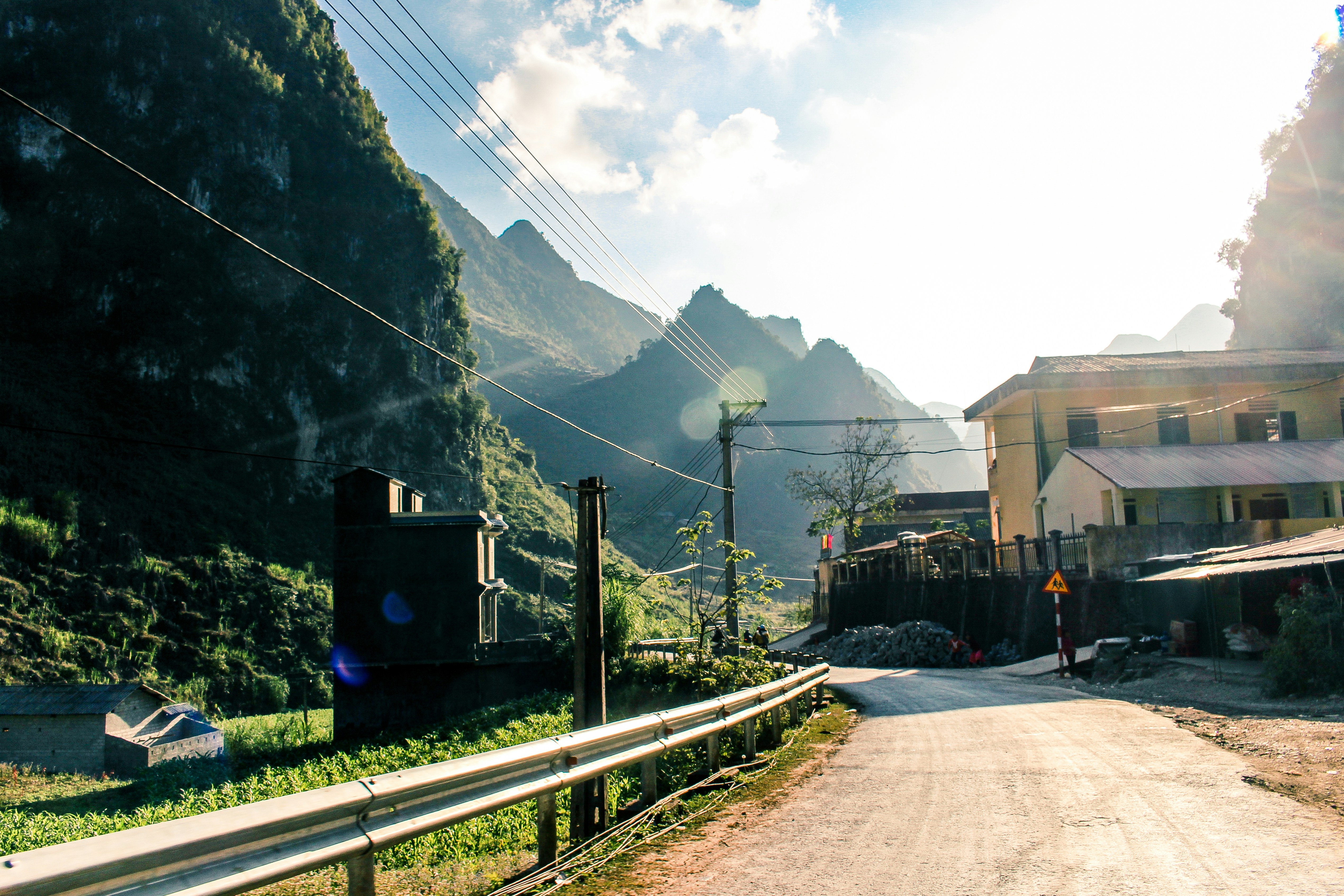 Sunlit Valley Road: A Quiet Ascent Through Mountain Village