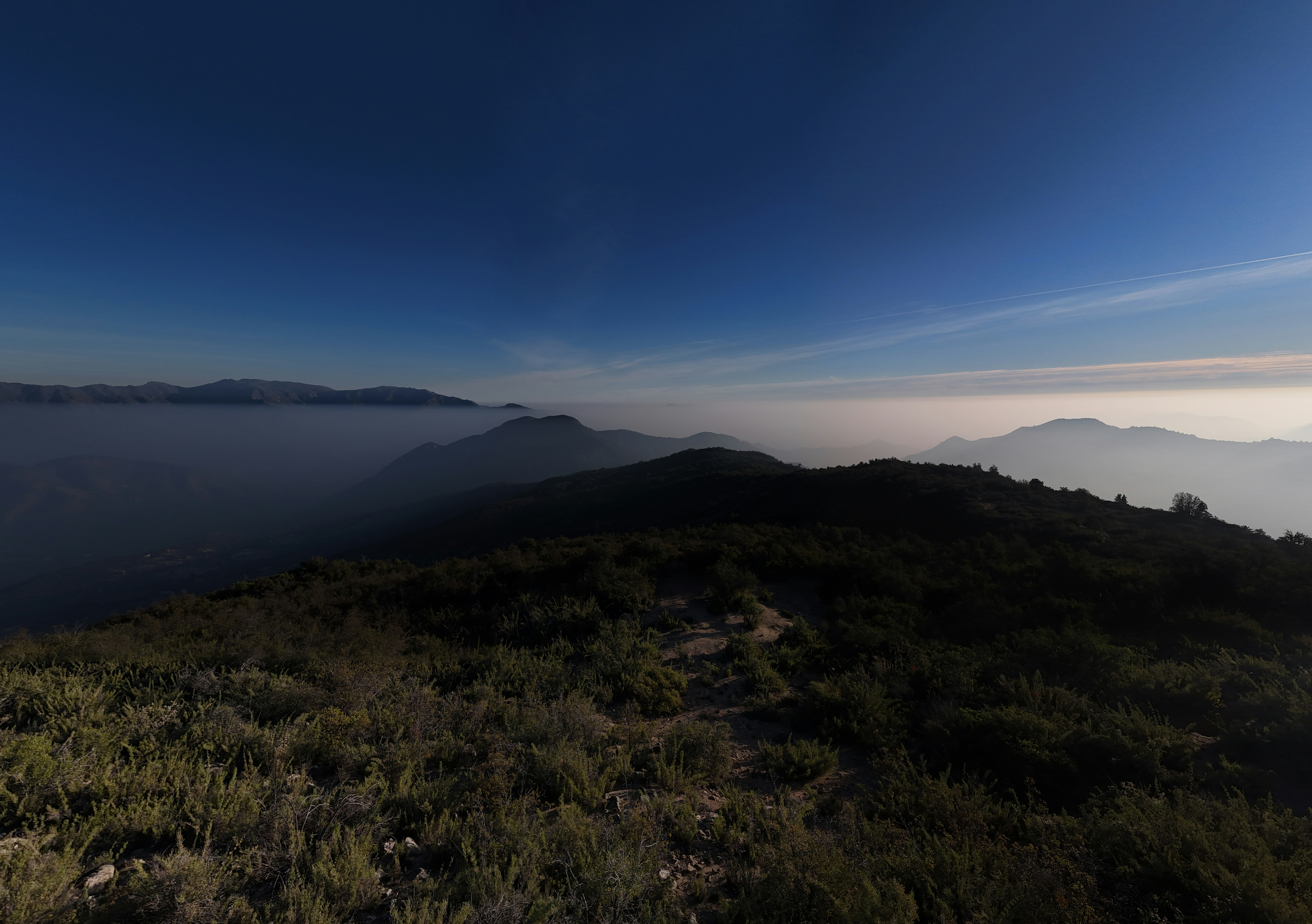 Misty ridge above a sagebrush sea at dawn