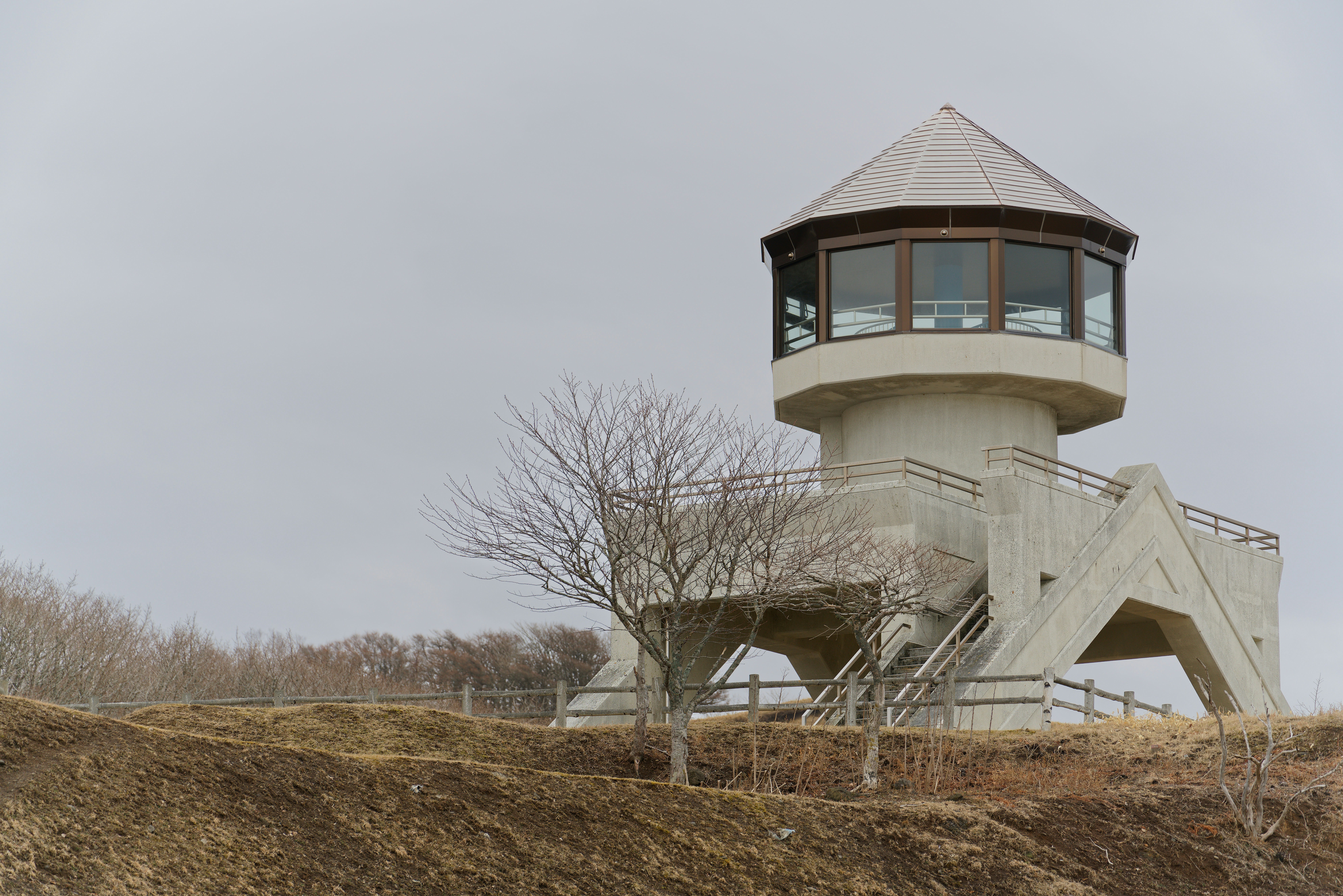 Watchtower Overlook: Concrete Edifice on a Gentle Knoll