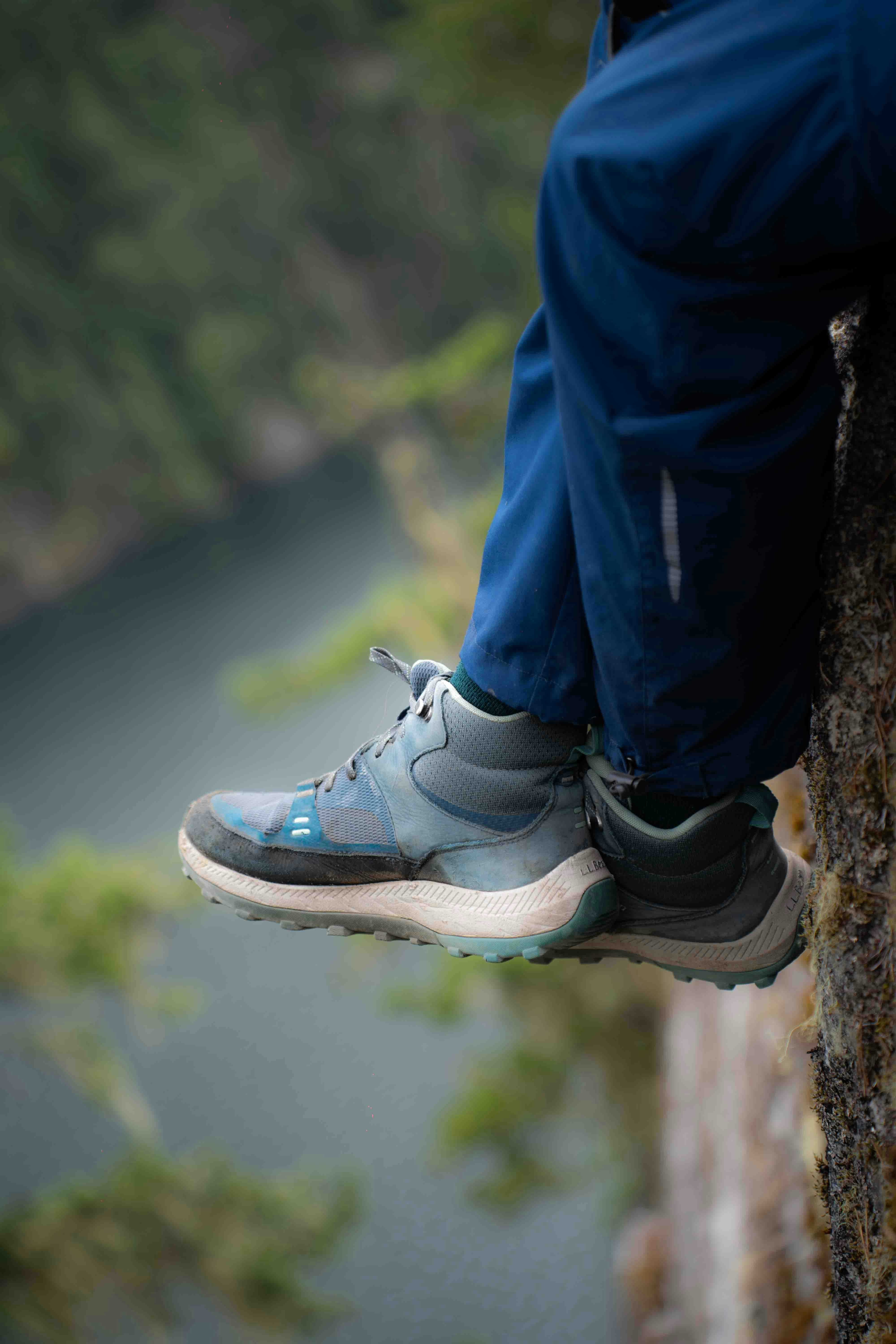 Cliff Edge Descent: Trail Runner’s Footsteps on a Ledge