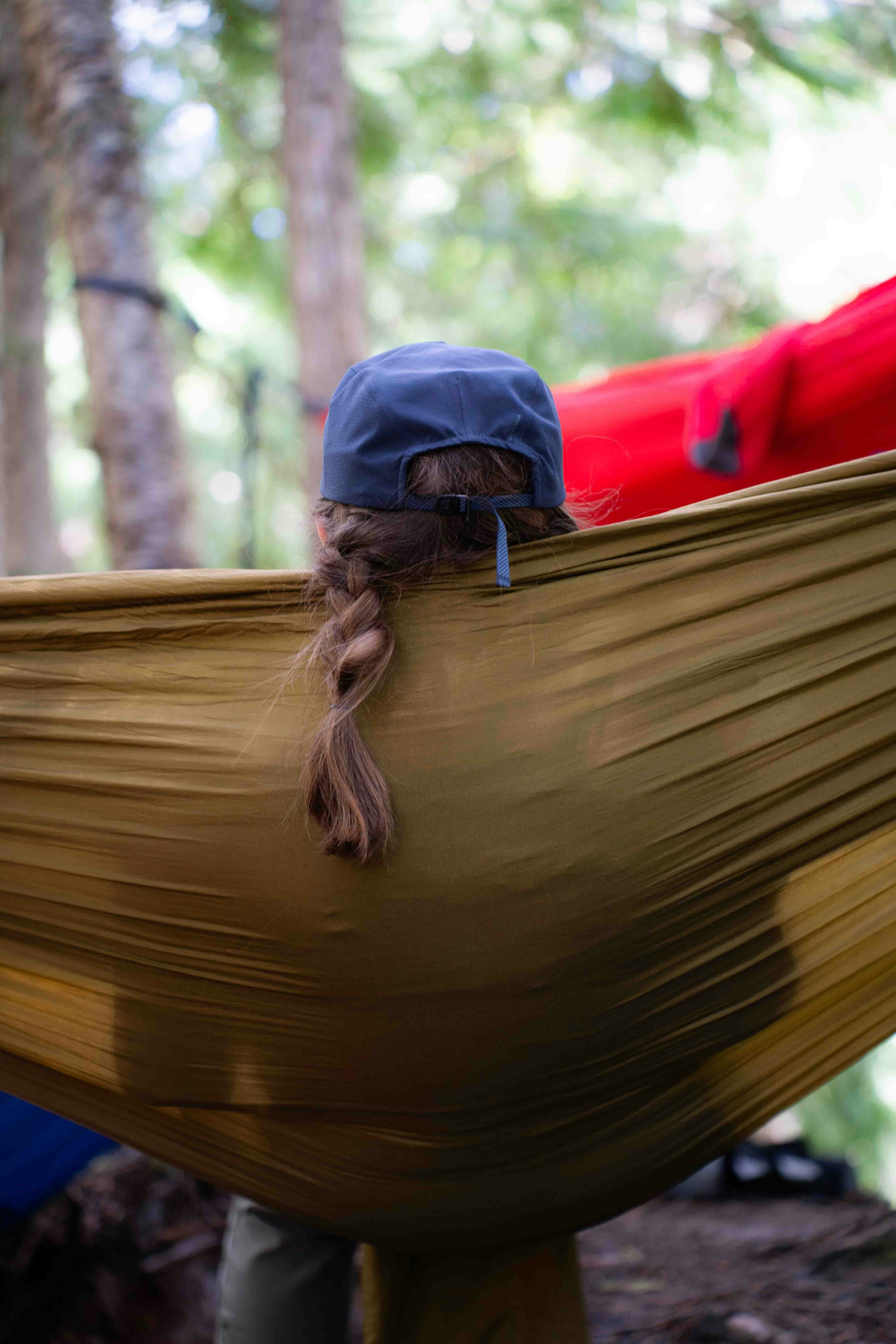 Hammock Pause: The Back-of-Head in Forest Light