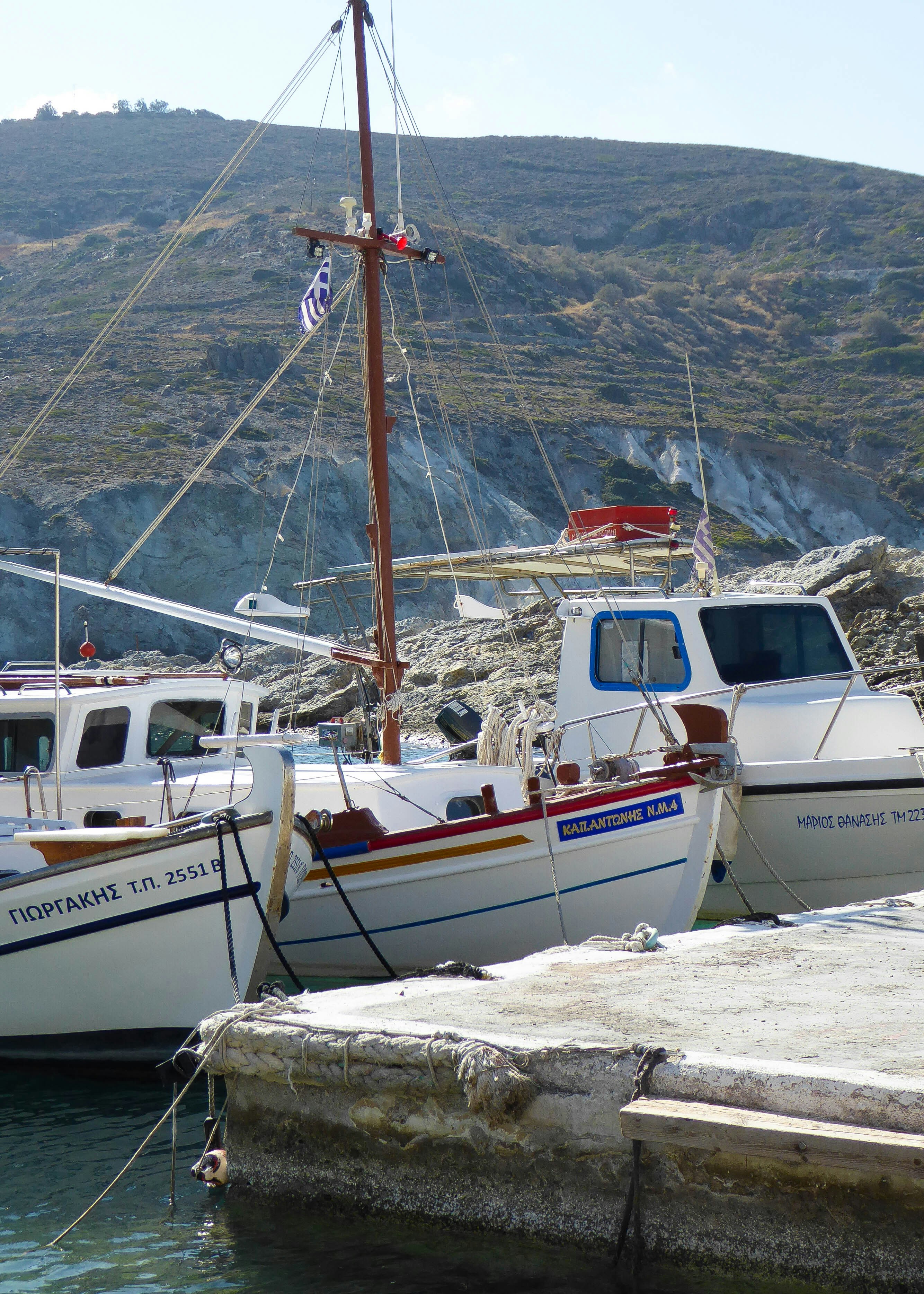 Docked Sailboats at the Cliffside Harbor