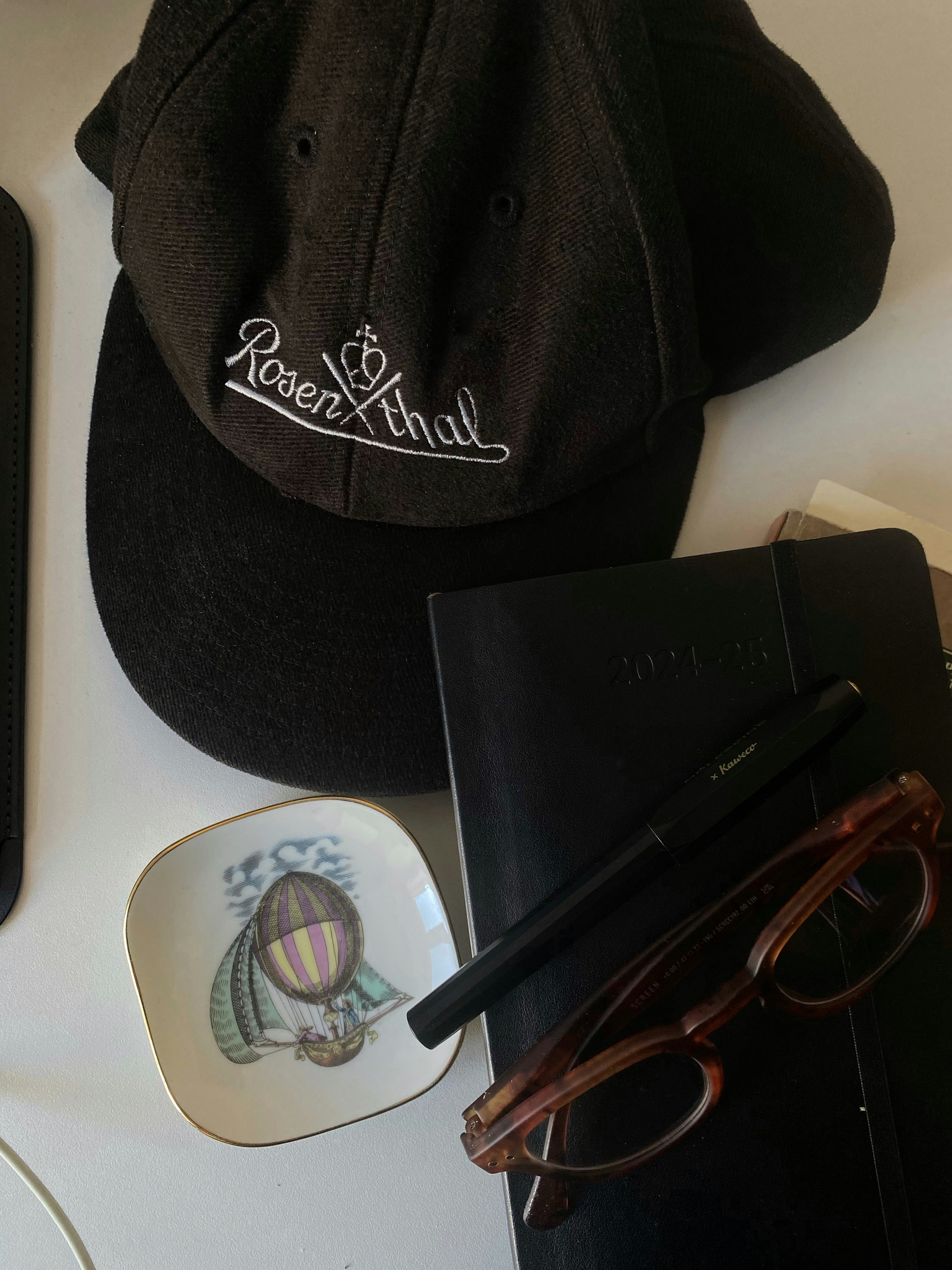 Caps and Clockwork: A Quiet Desk Corner