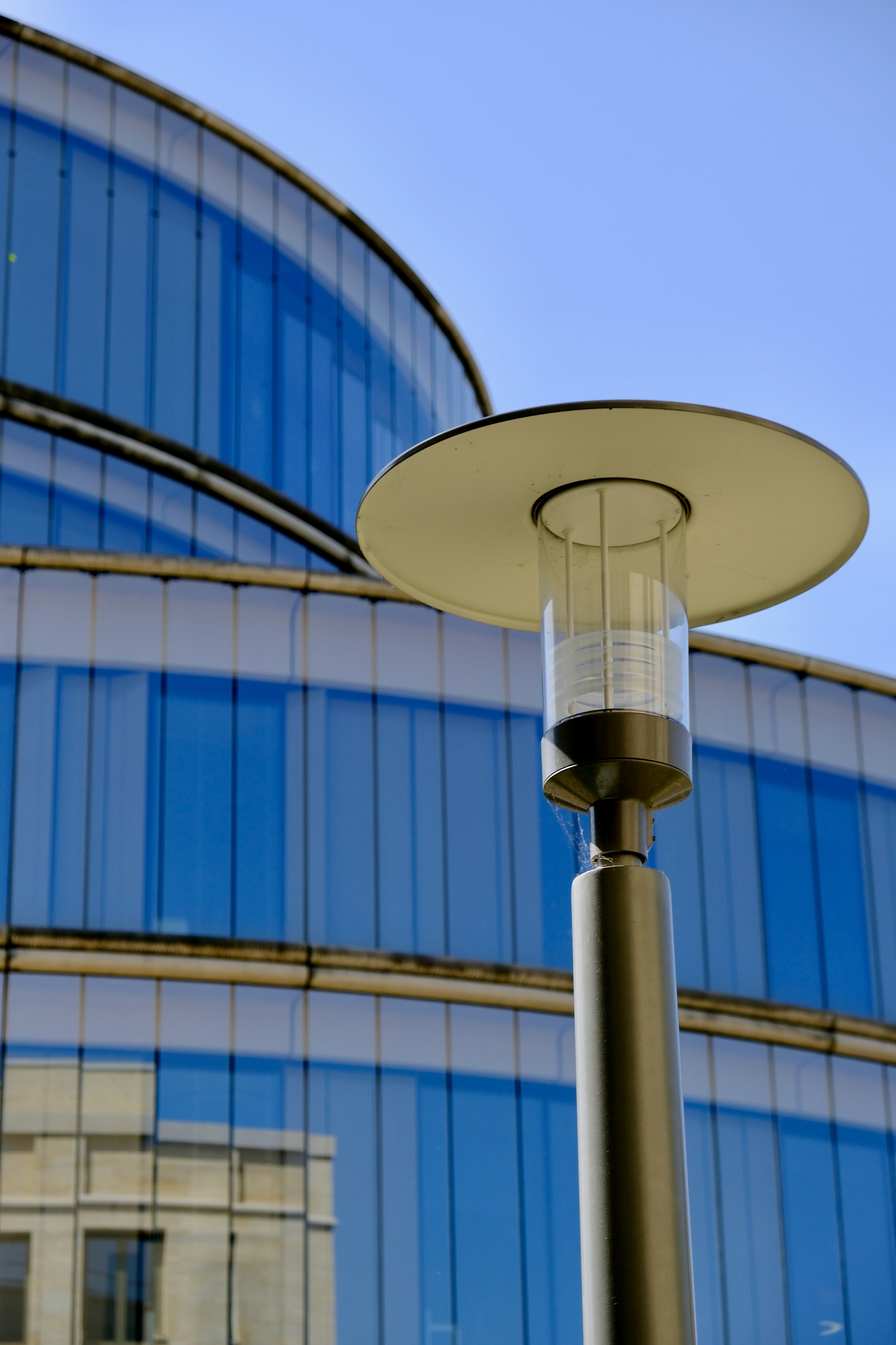 Urban Glass and Lantern: A Vertical Lens to the Sky