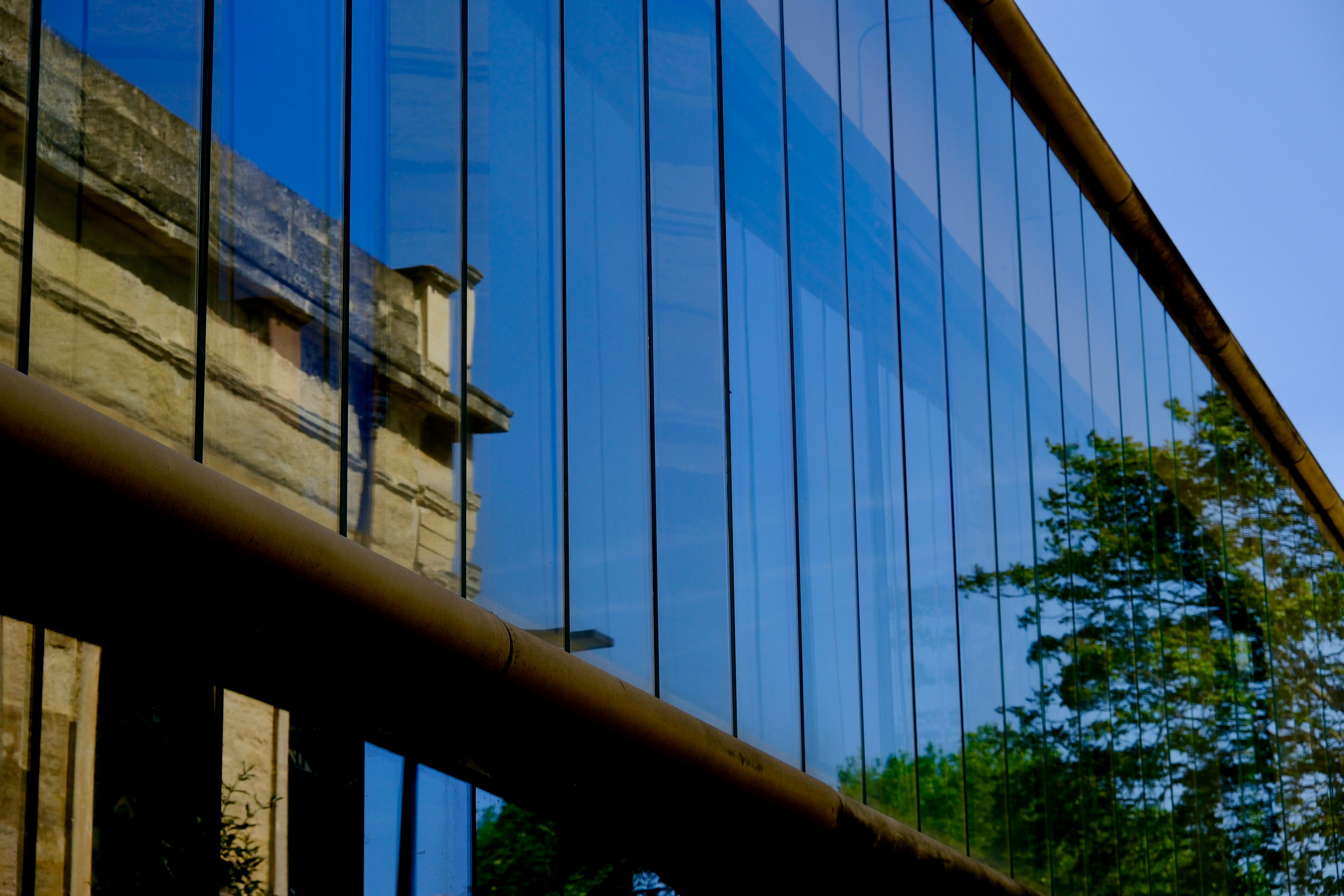 Reflections on Glass: A Modern Facade Refracts the Sky
