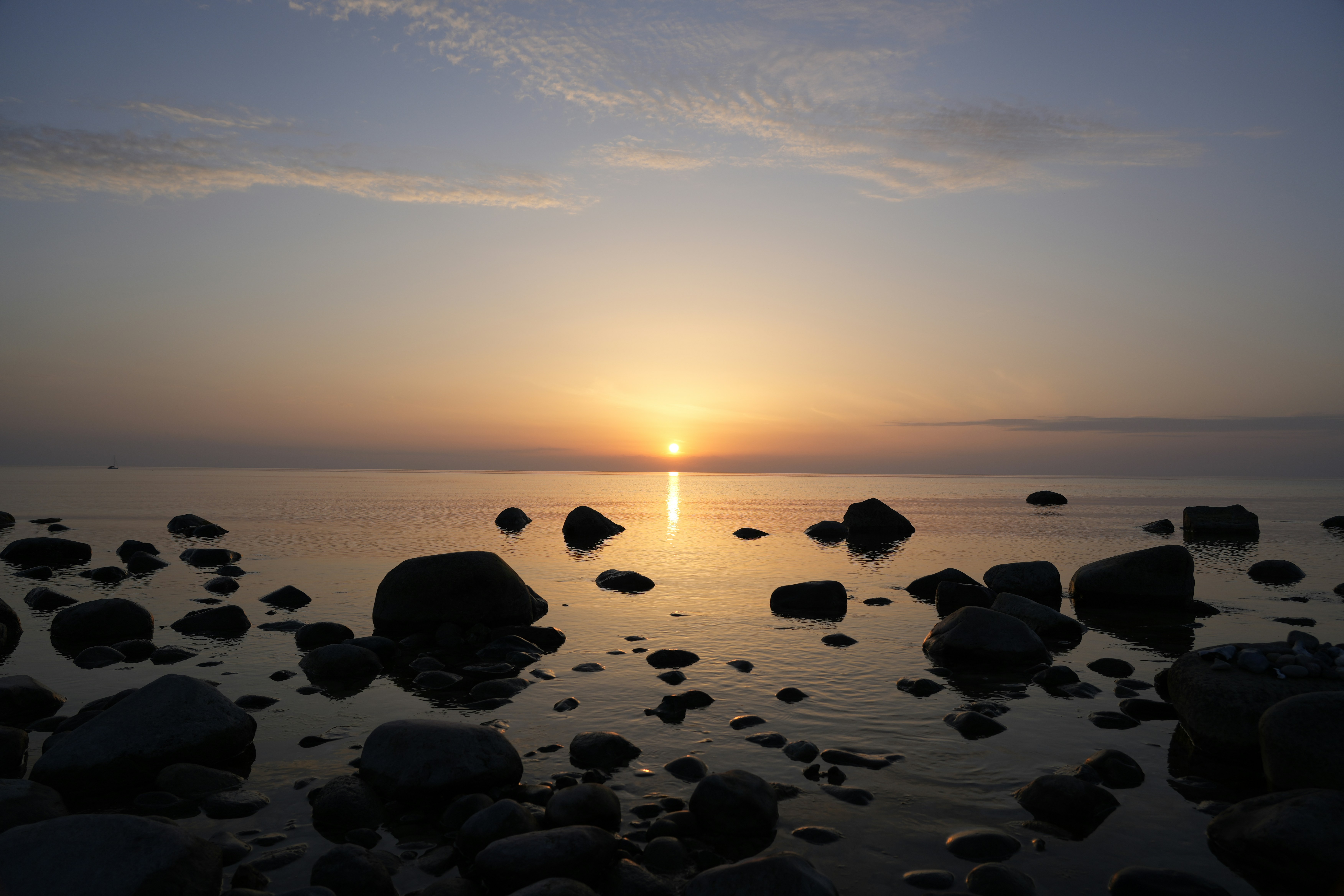 Horizon Ember: Sunset Over the Quiet Sea of Stones