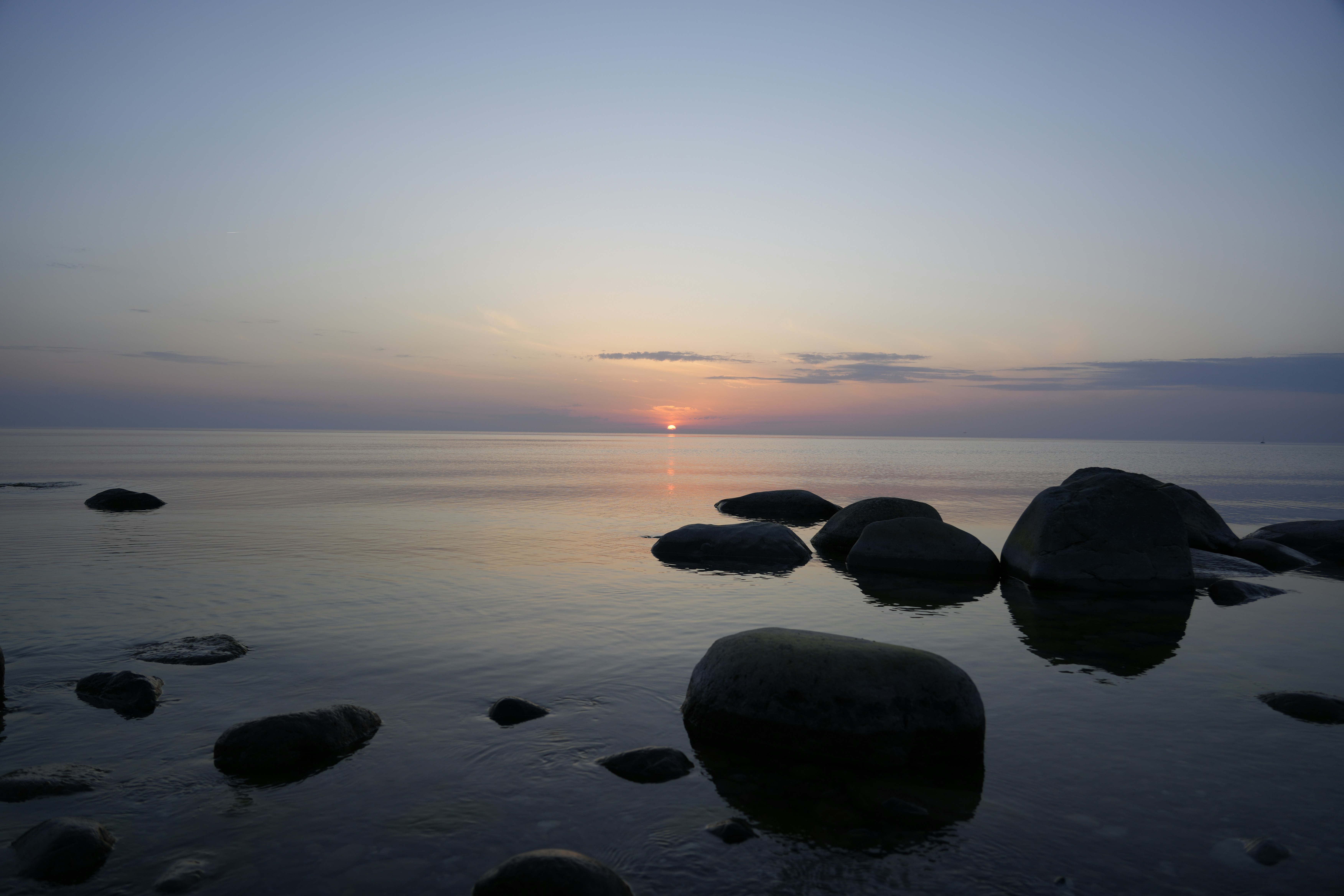 Sunlit Flats: Stones and Silence at Dusk