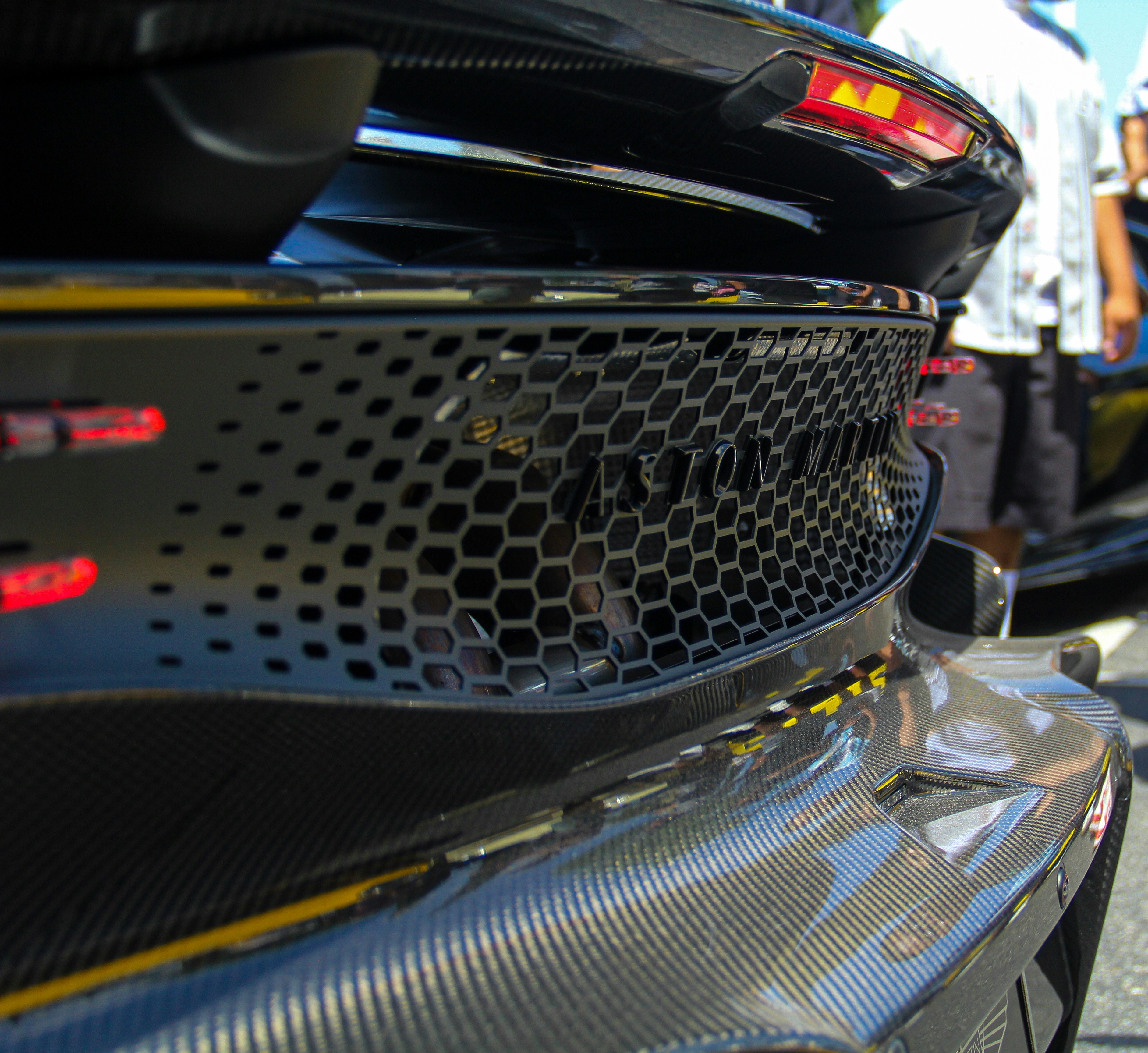 Honeycomb Grille and Carbon Fiber Curves: A Close-Up of a Performance Car