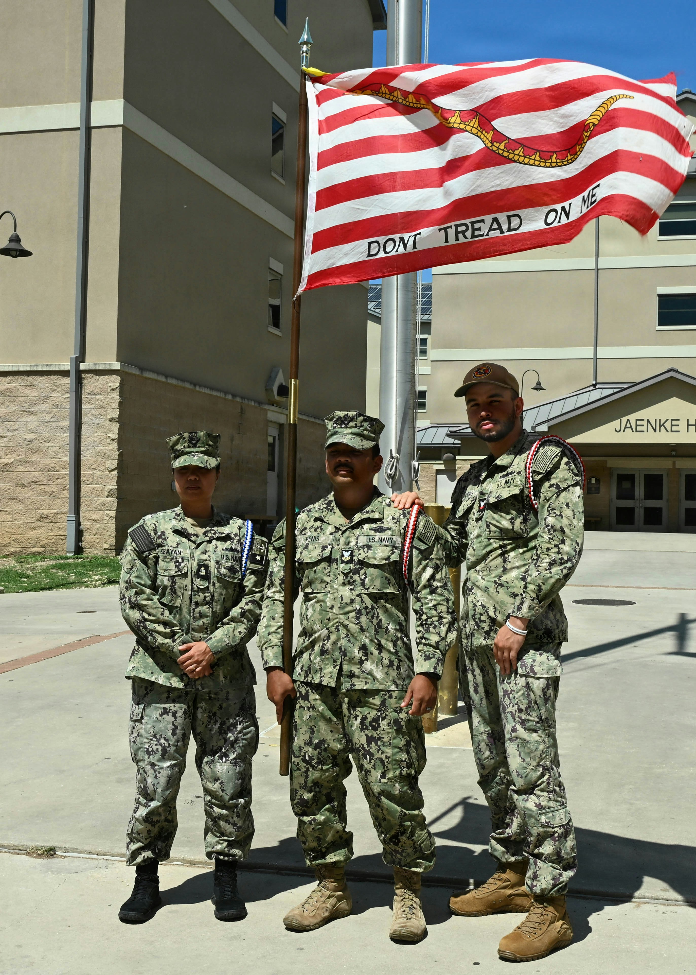 Guardians at the Flag: A Moment Beneath the Don’t Tread On Me Banner