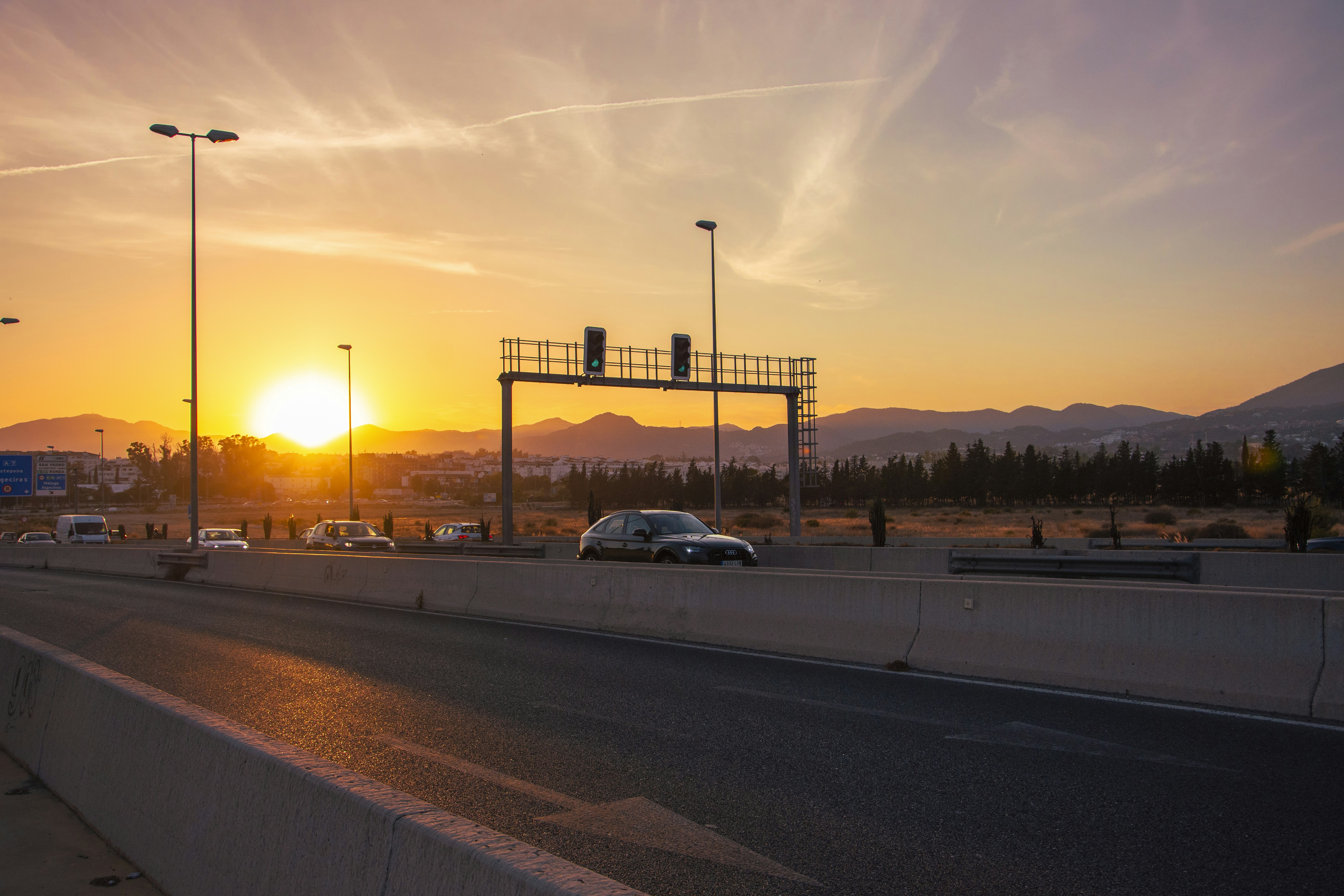 Sunset Over the Highway: Golden Light Framing a Quiet Moment