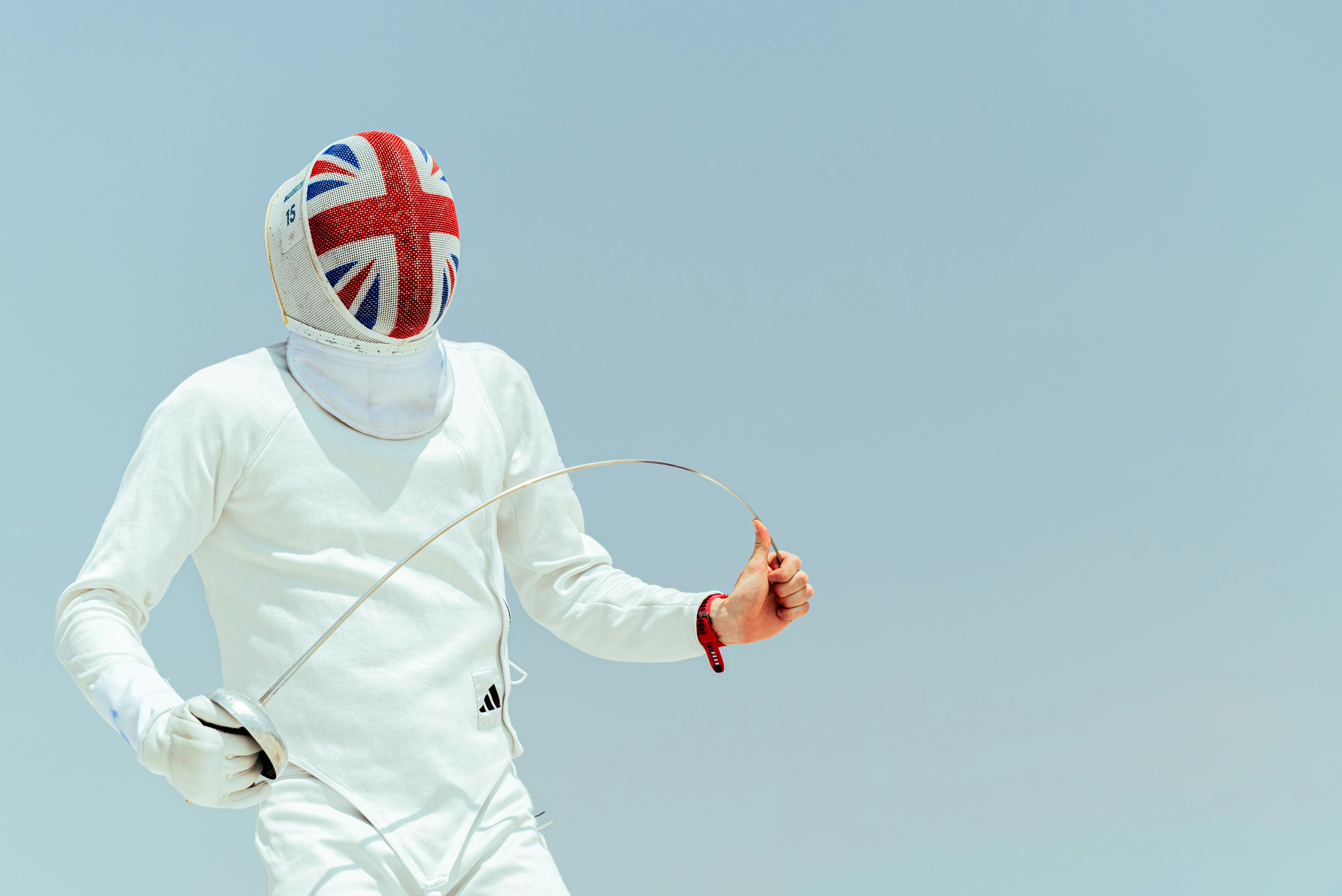 Union Jack Fencer Under a Clear Sky