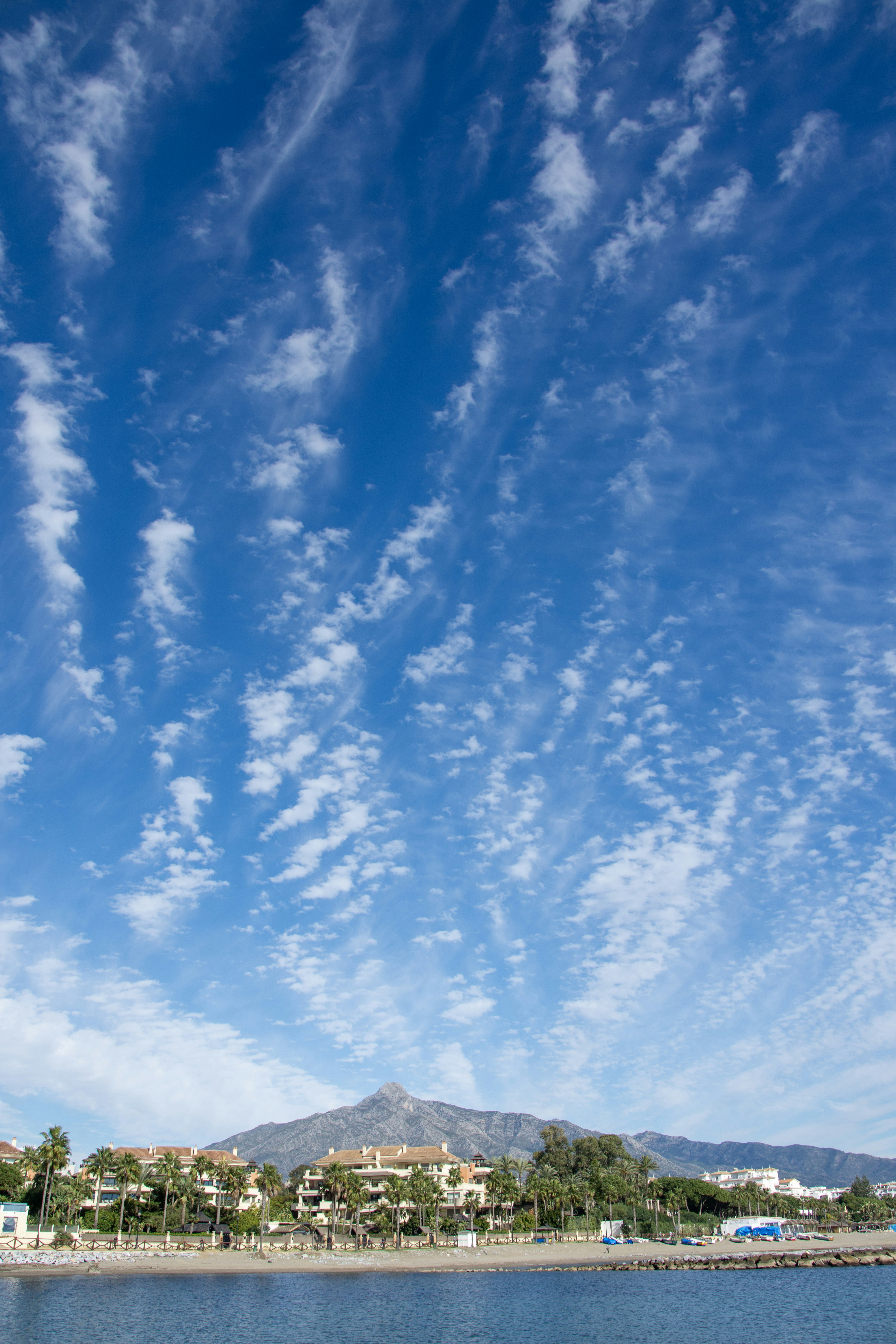 Coastal Ridge at Dusk: A Quiet Seaside Neighborhood Beneath a Dreamy Sky