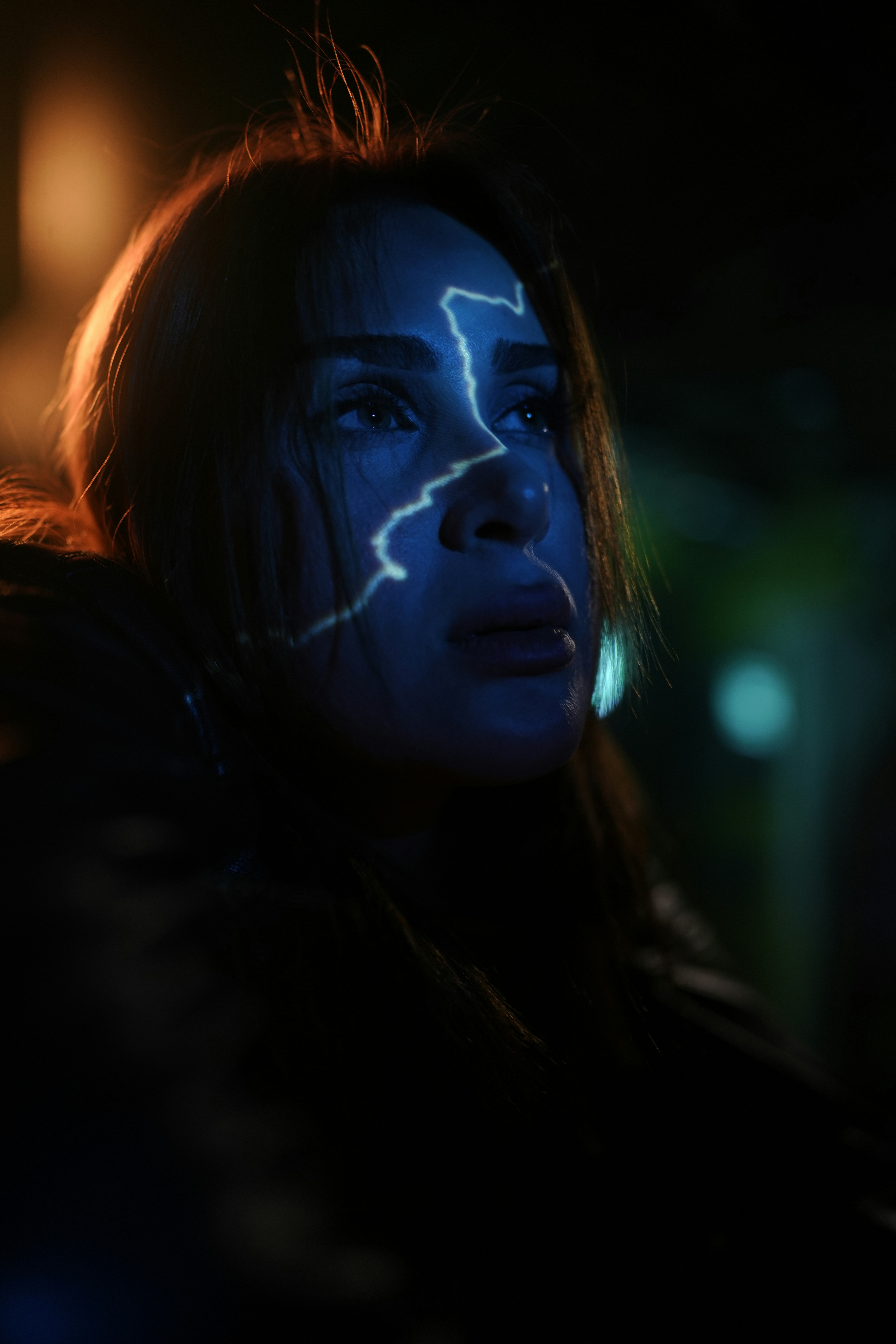 Neon Pulse: Face lit by electric blue lightning across a dimly lit night