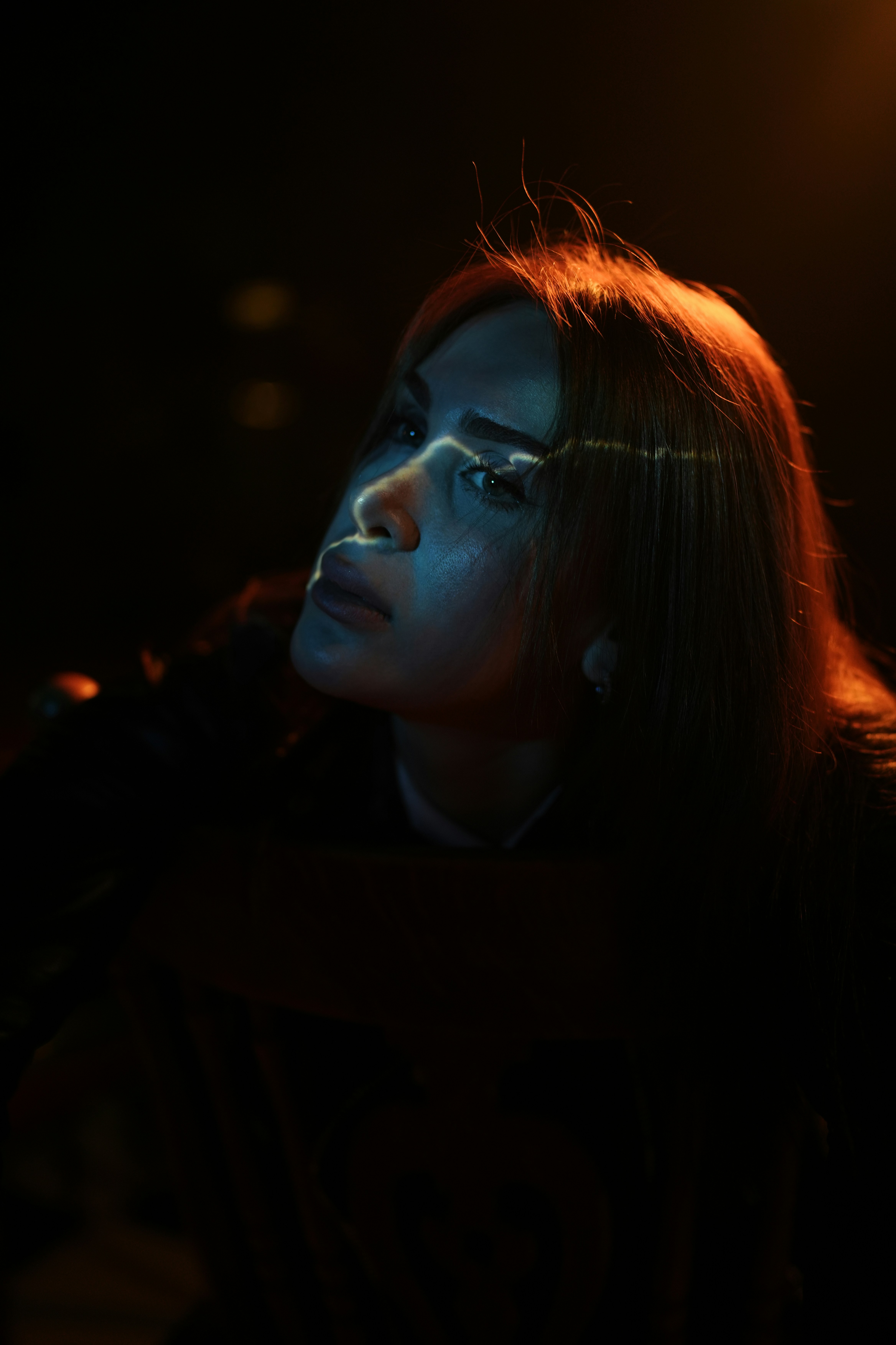 Blue Glow on a Quiet Subject: Night Portrait in Soft Neon