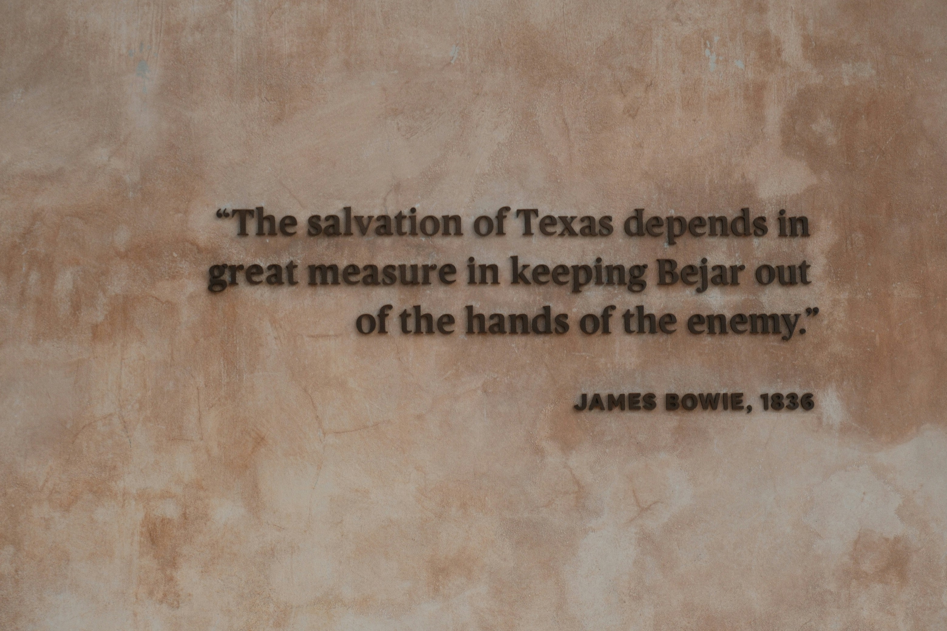 Quote on a Weathered Wall: The Salvation of Texas