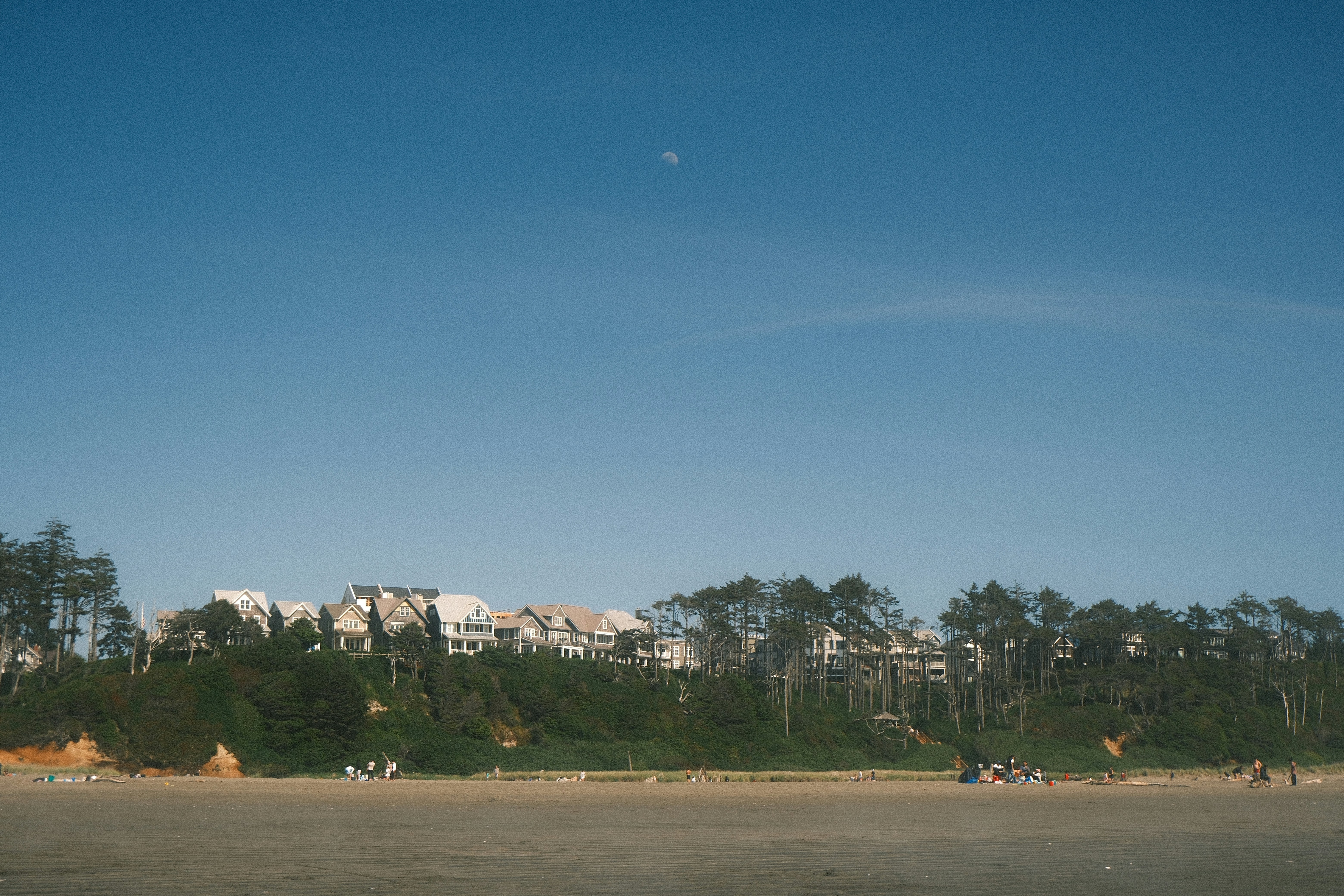 Coastal Village Silhouette Under a Clear Sky