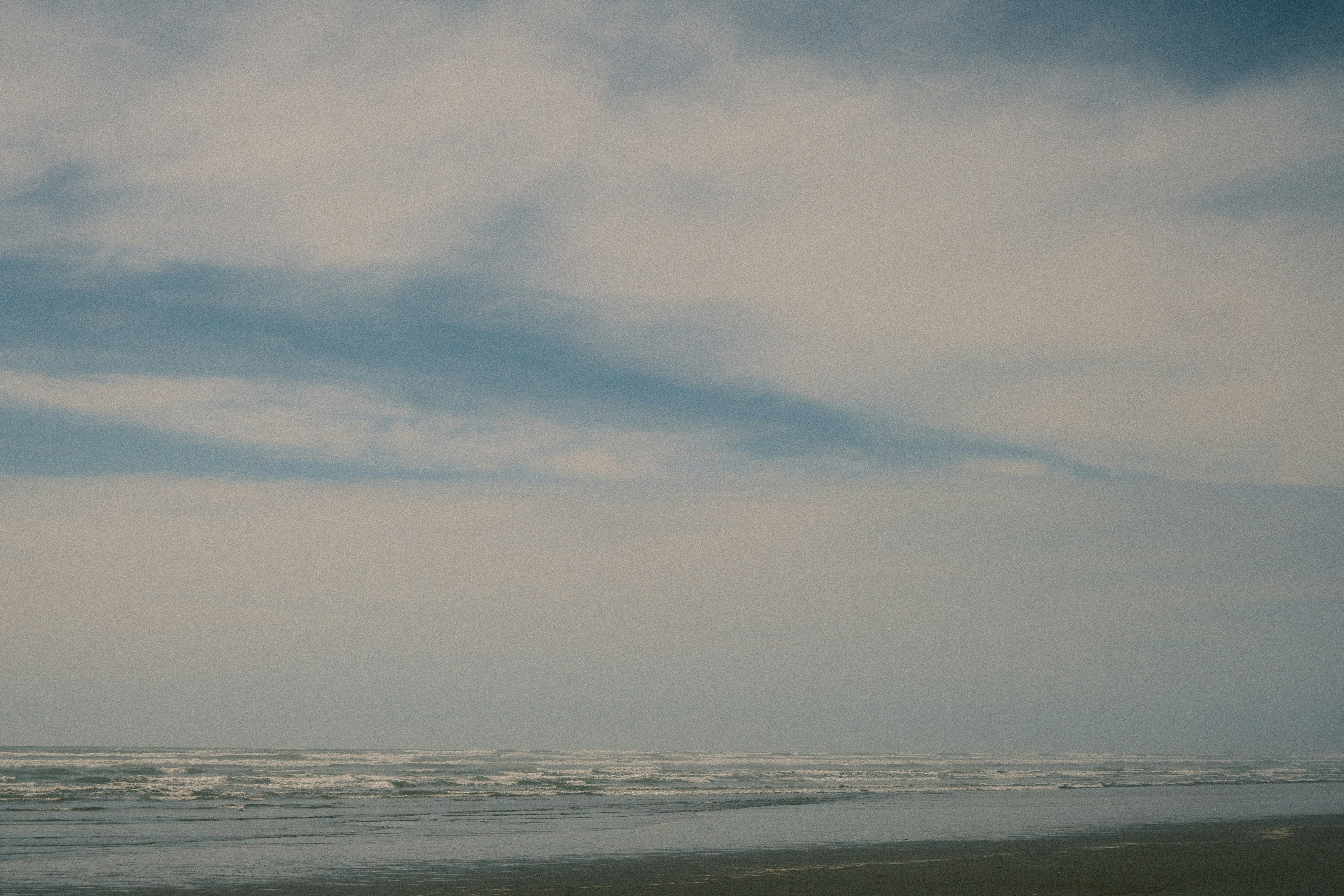 Quiet Horizon: Shoreline Whisper Under Wide Sky