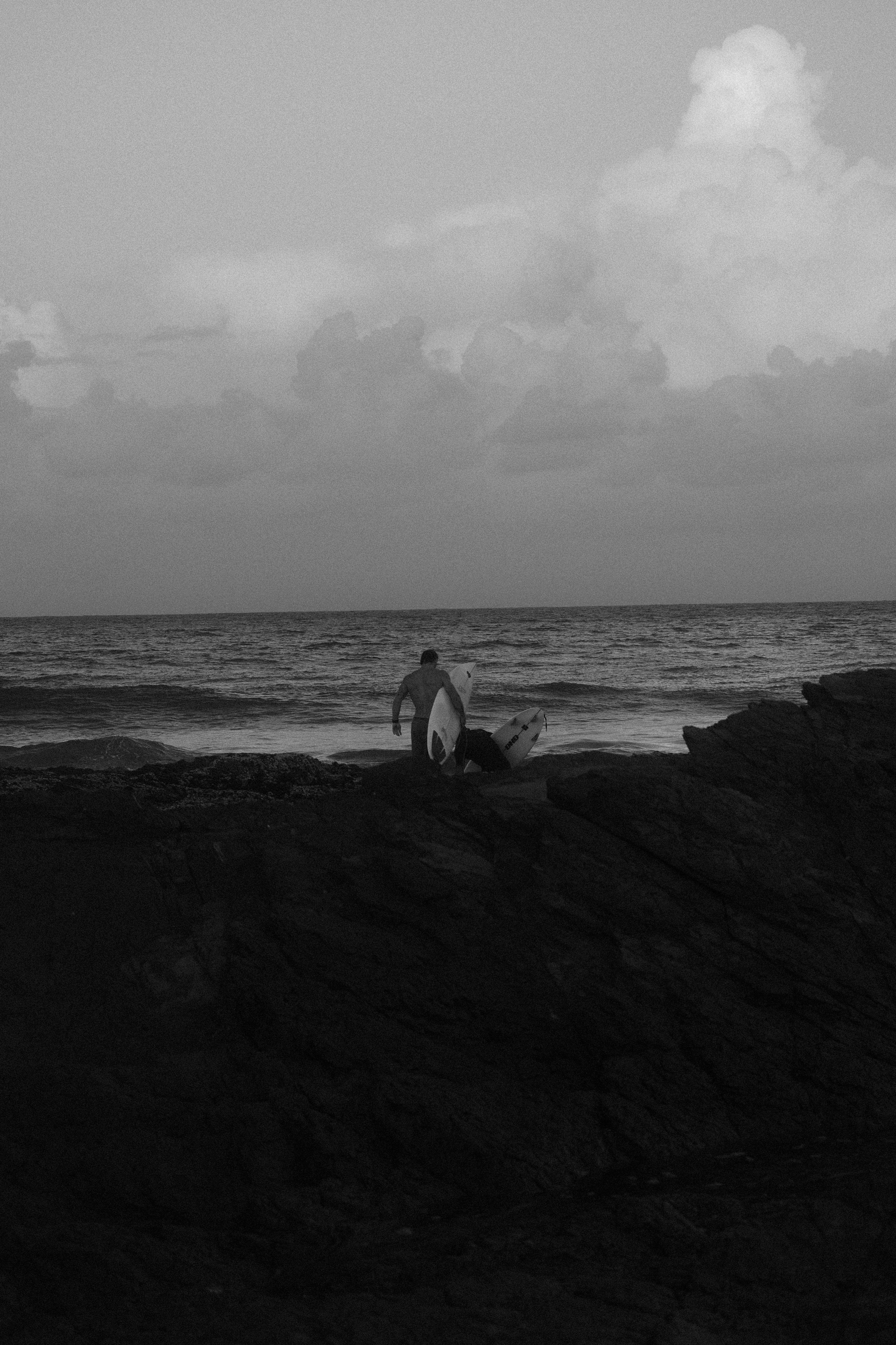 Surfer Reaches the Edge: A Quiet Sea Moment