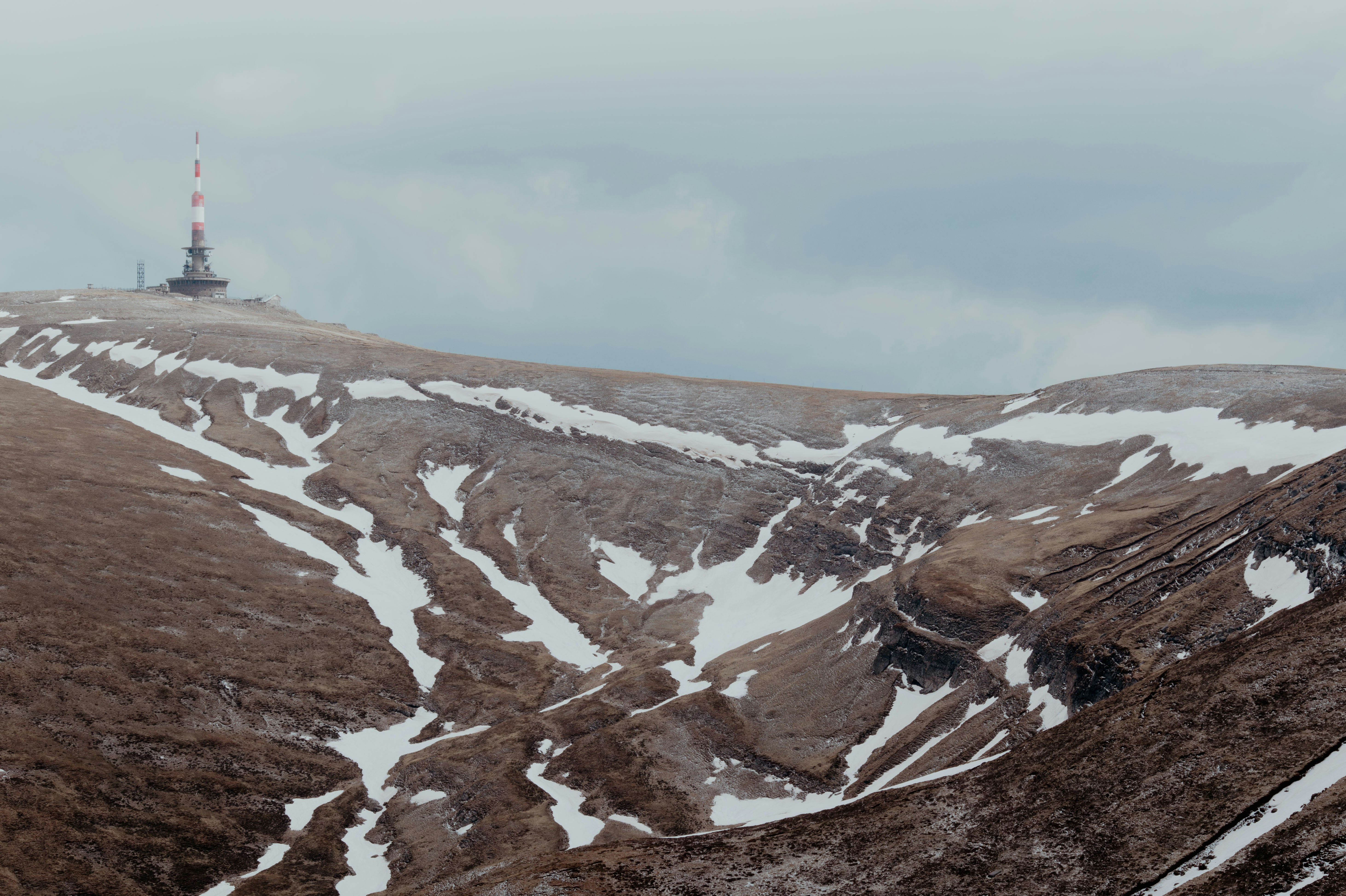 Snow-veiled Ridge and Communications Tower on Distant Crest