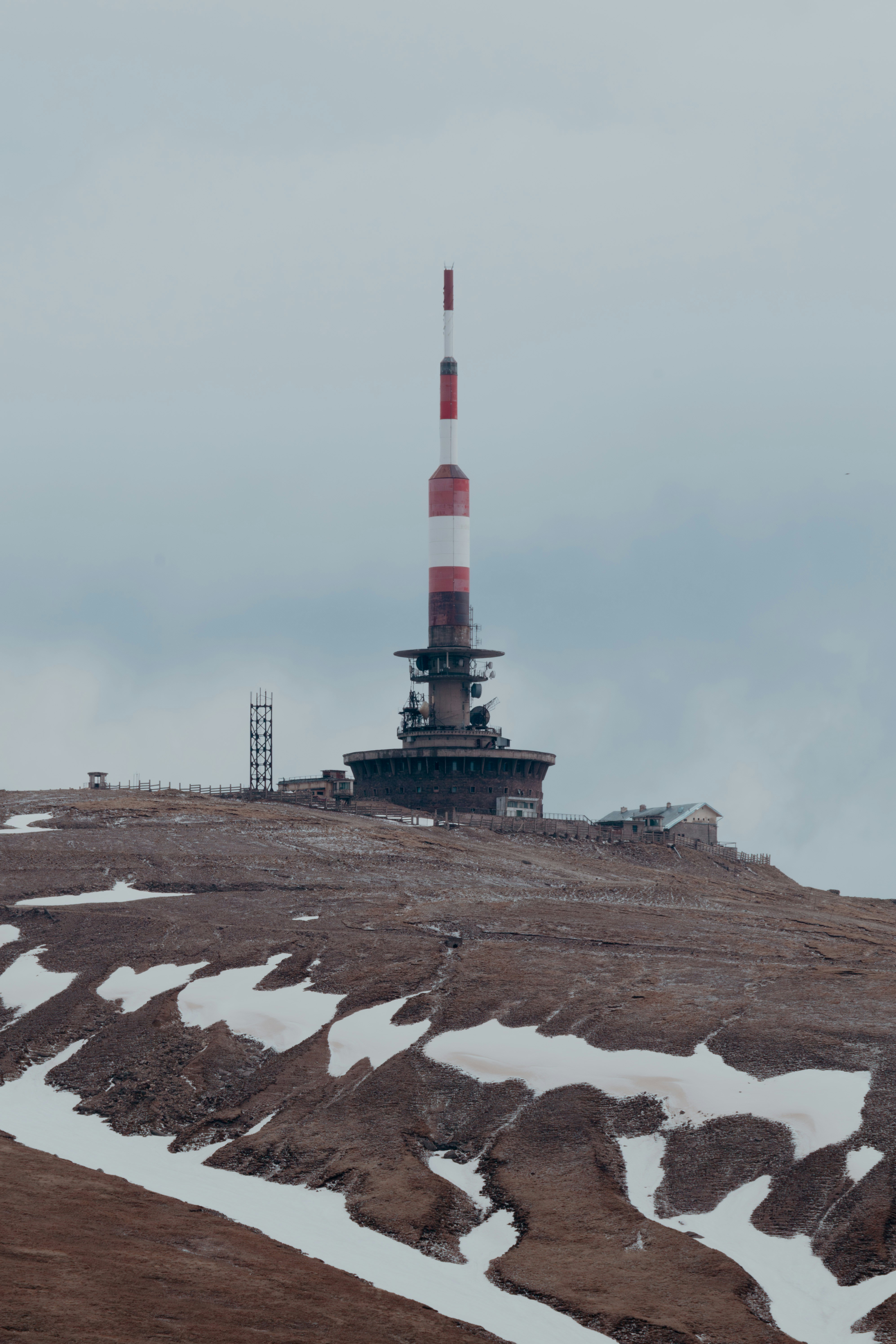 Signal Tower Rising Above Icy Slopes