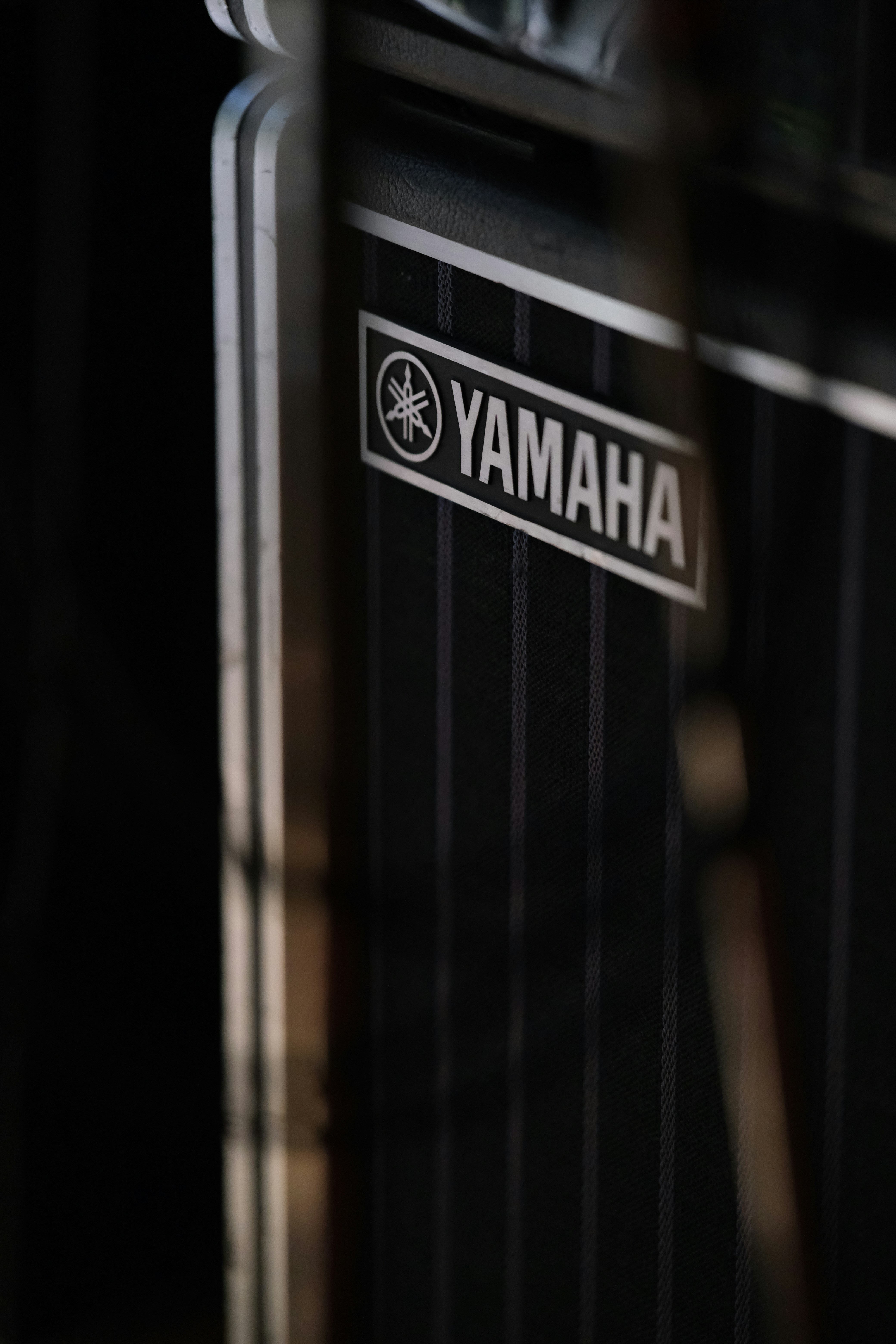  Yamaha badge in shallow focus: a glimpse of vintage metalwork