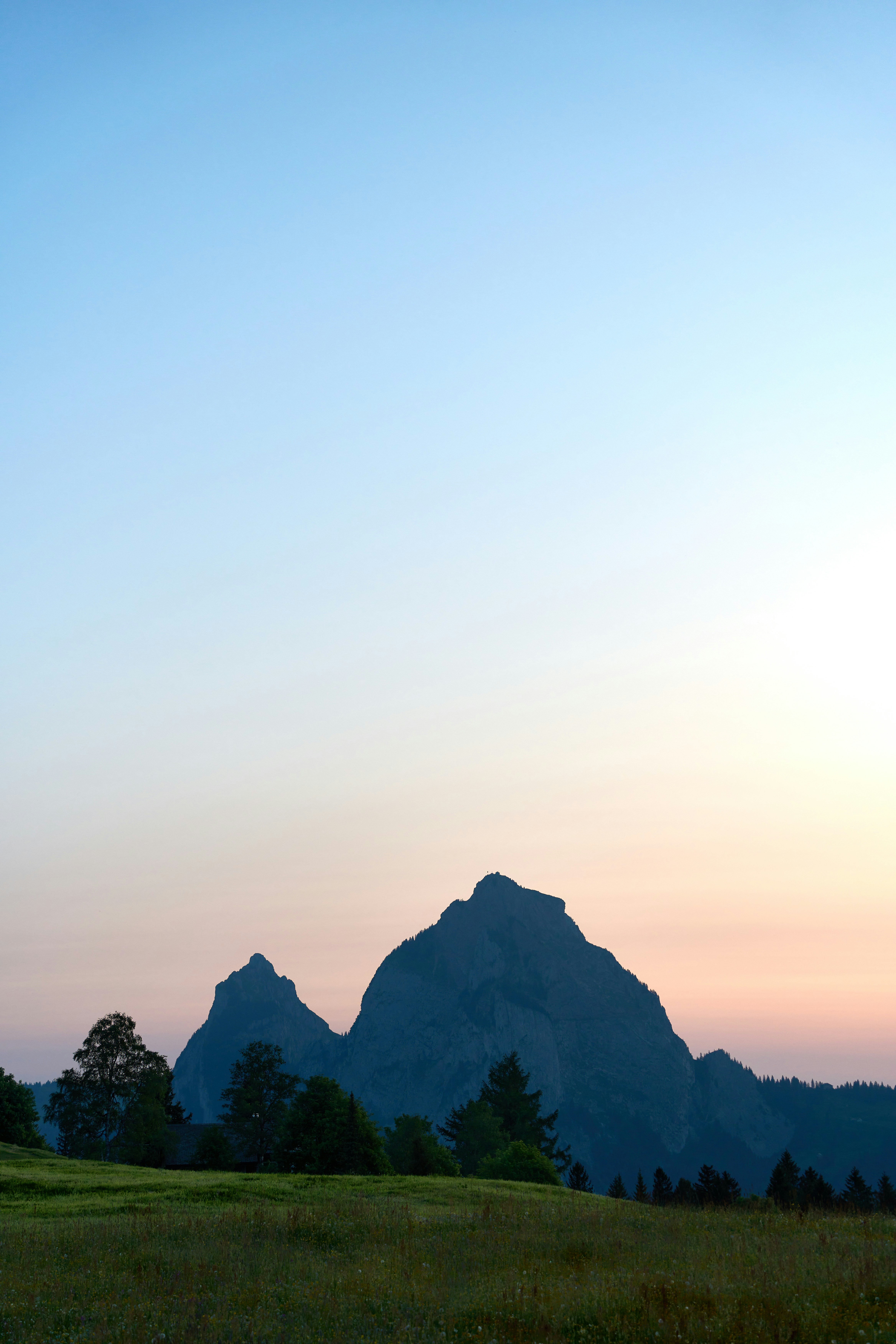 Twin Peaks at Sunset: A Field’s Quiet Horizon
