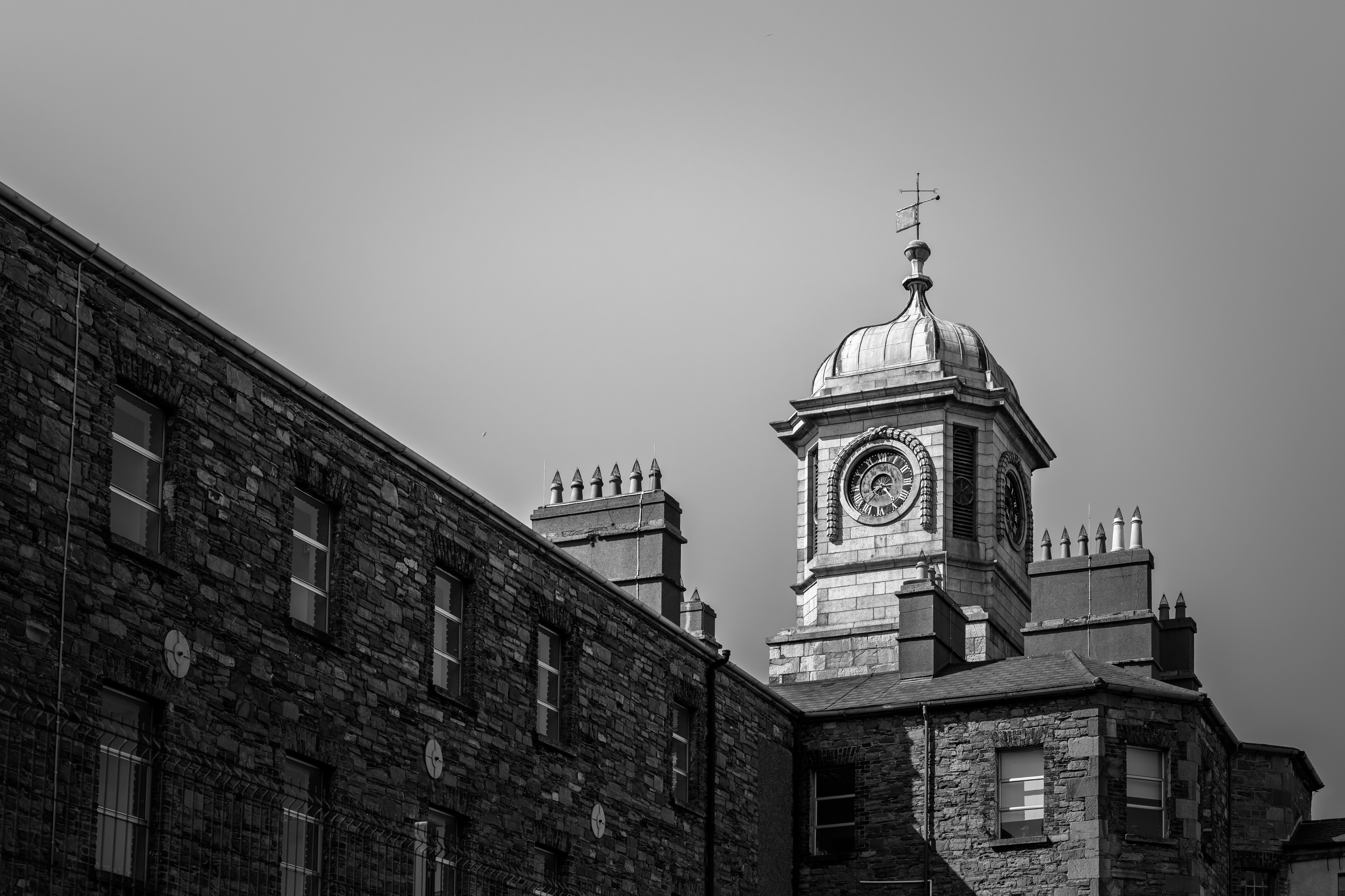 Clocktower on the Brick Arc: A Quiet Rooftop Perspective