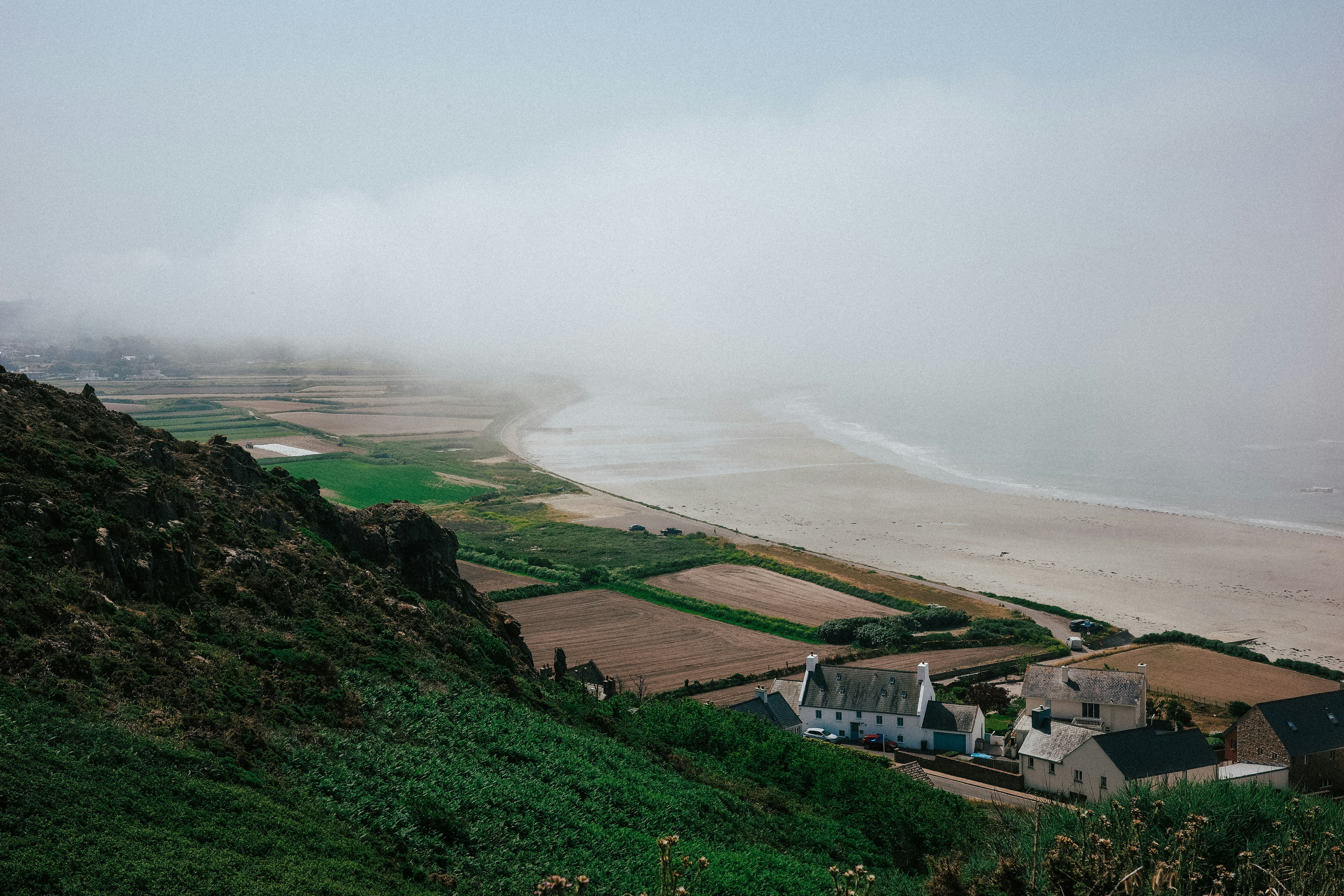Coastal Valley Terrace: Fields, Fog and a Quiet Hamlet