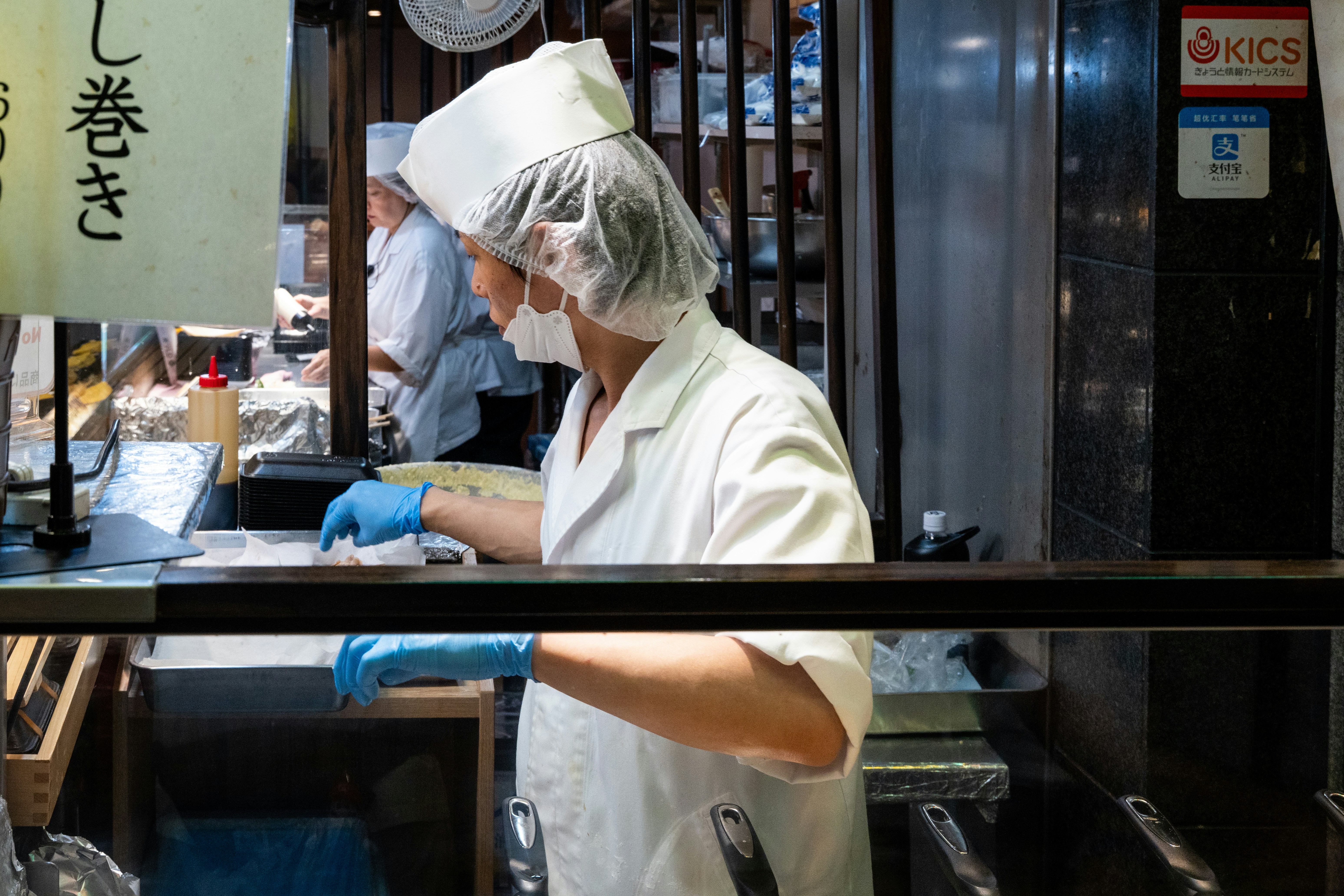 Midday Sushi Counter: The Technician at Work