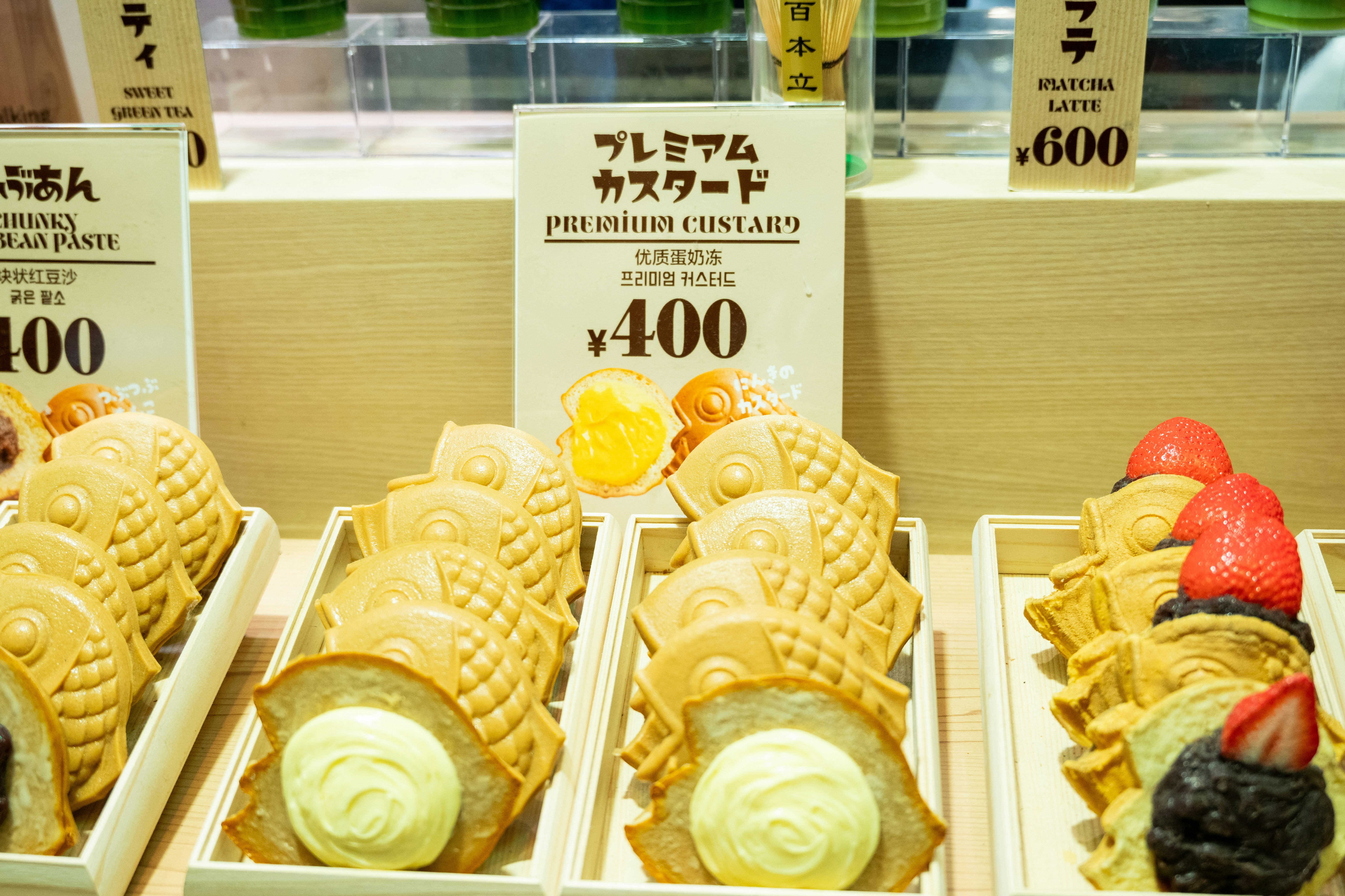 Golden Creams in a Japanese Pastry Display