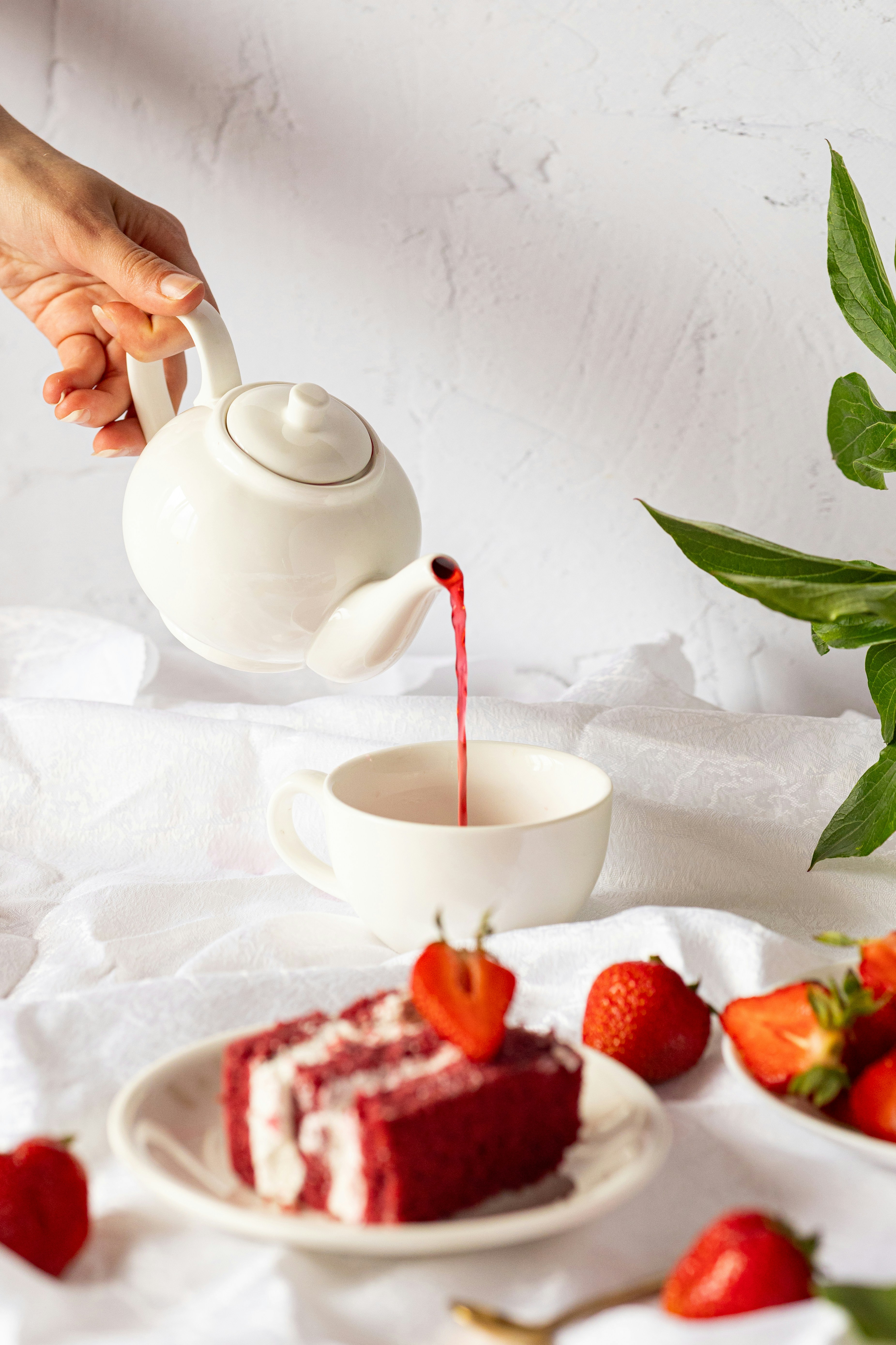 Pouring Red Velvet: A Quiet Moment of Tea and Cake